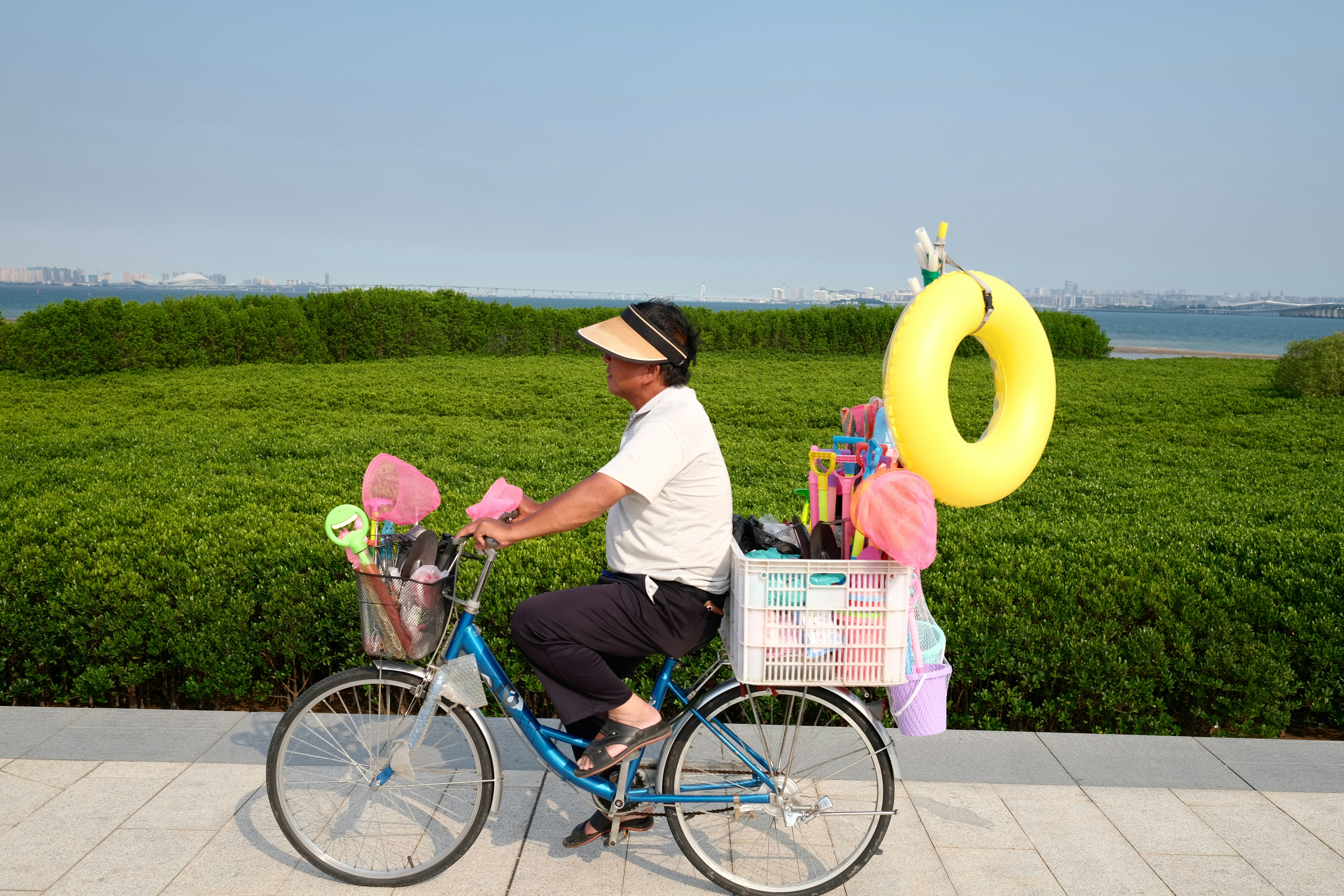 Lifeguard of the Lime-Belt: A Cheerful Bicycle Courier by the Sea