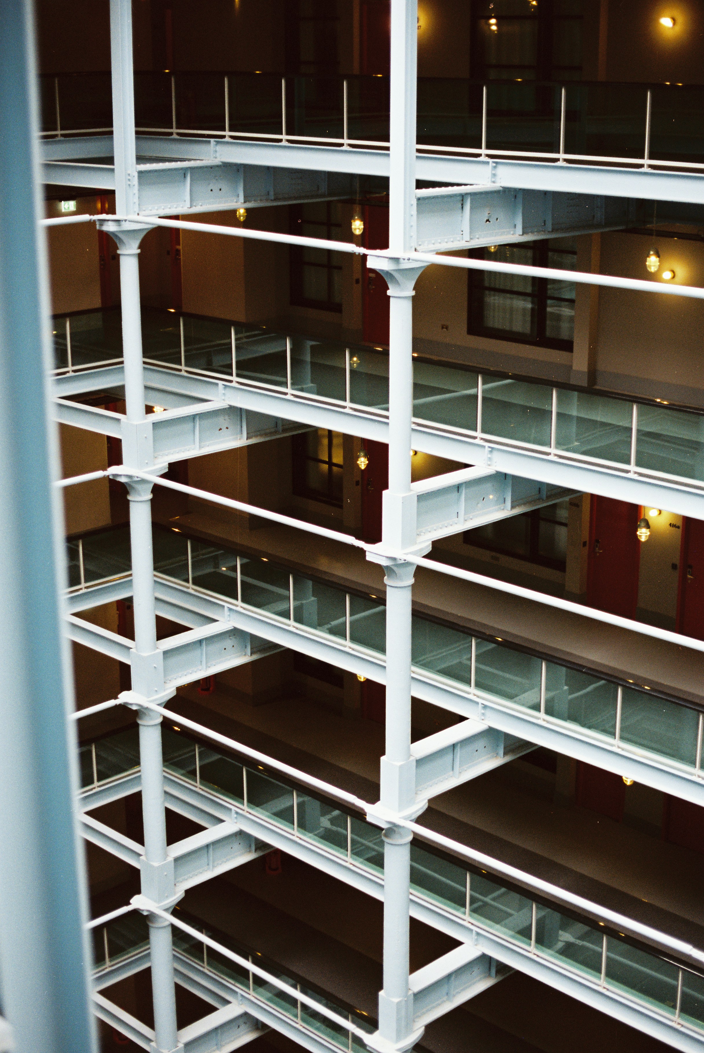 Industrial Atrium Grid: Repetition of white structural Beams