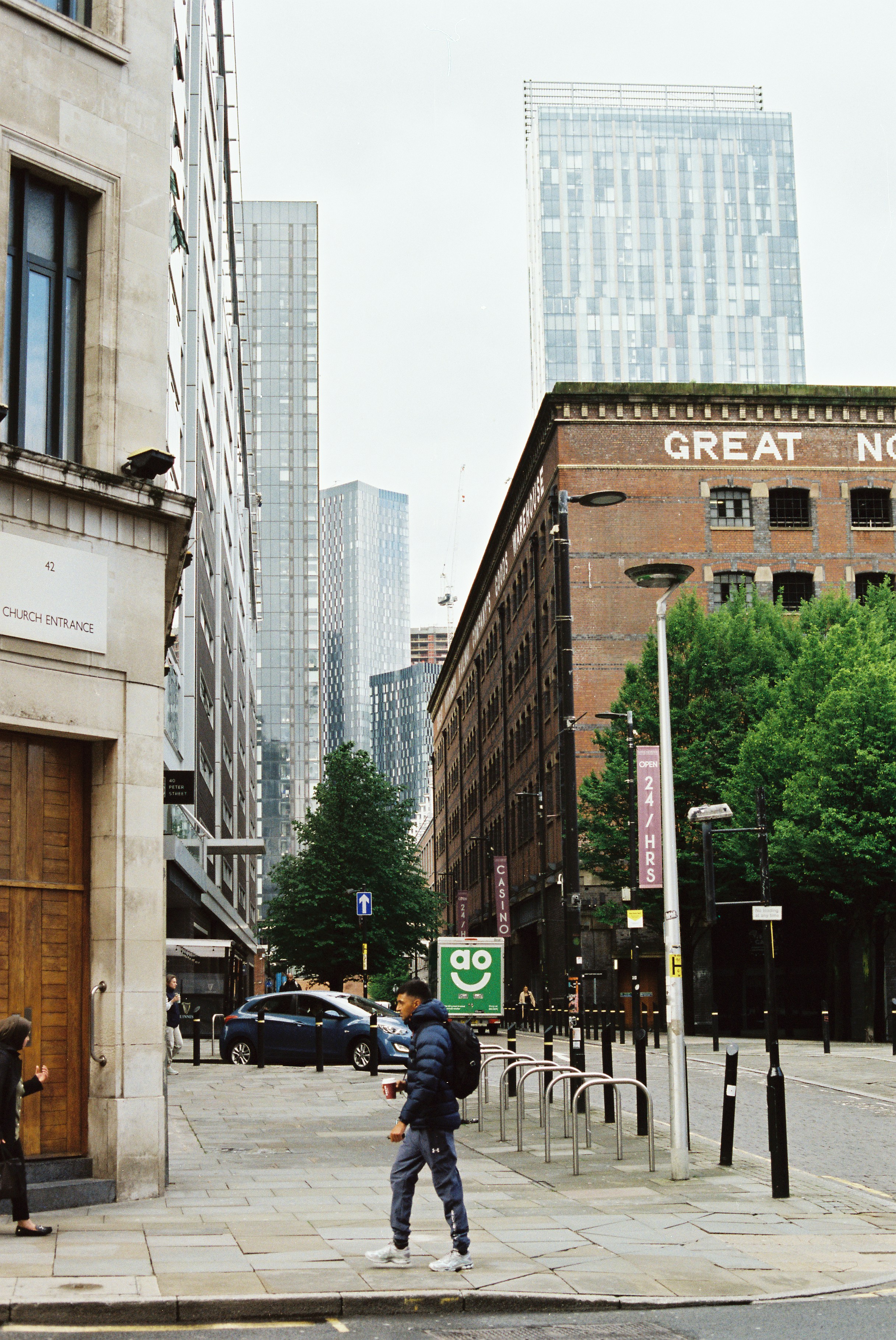 City Crossing: A Quiet Moment Amid Towering Steel