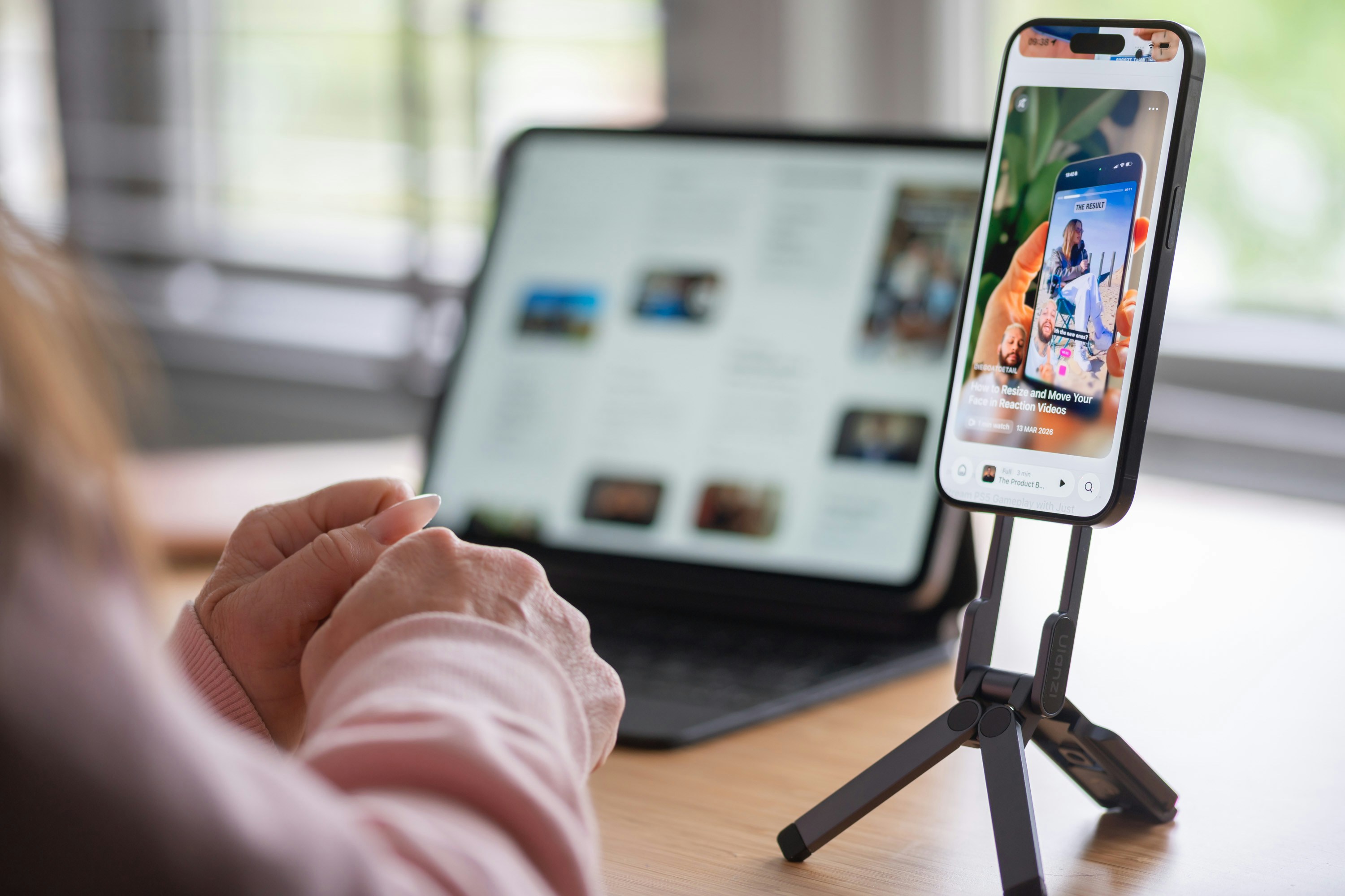 Smartphone on a Tiny Tripod Captures a Cozy Tech Workspace