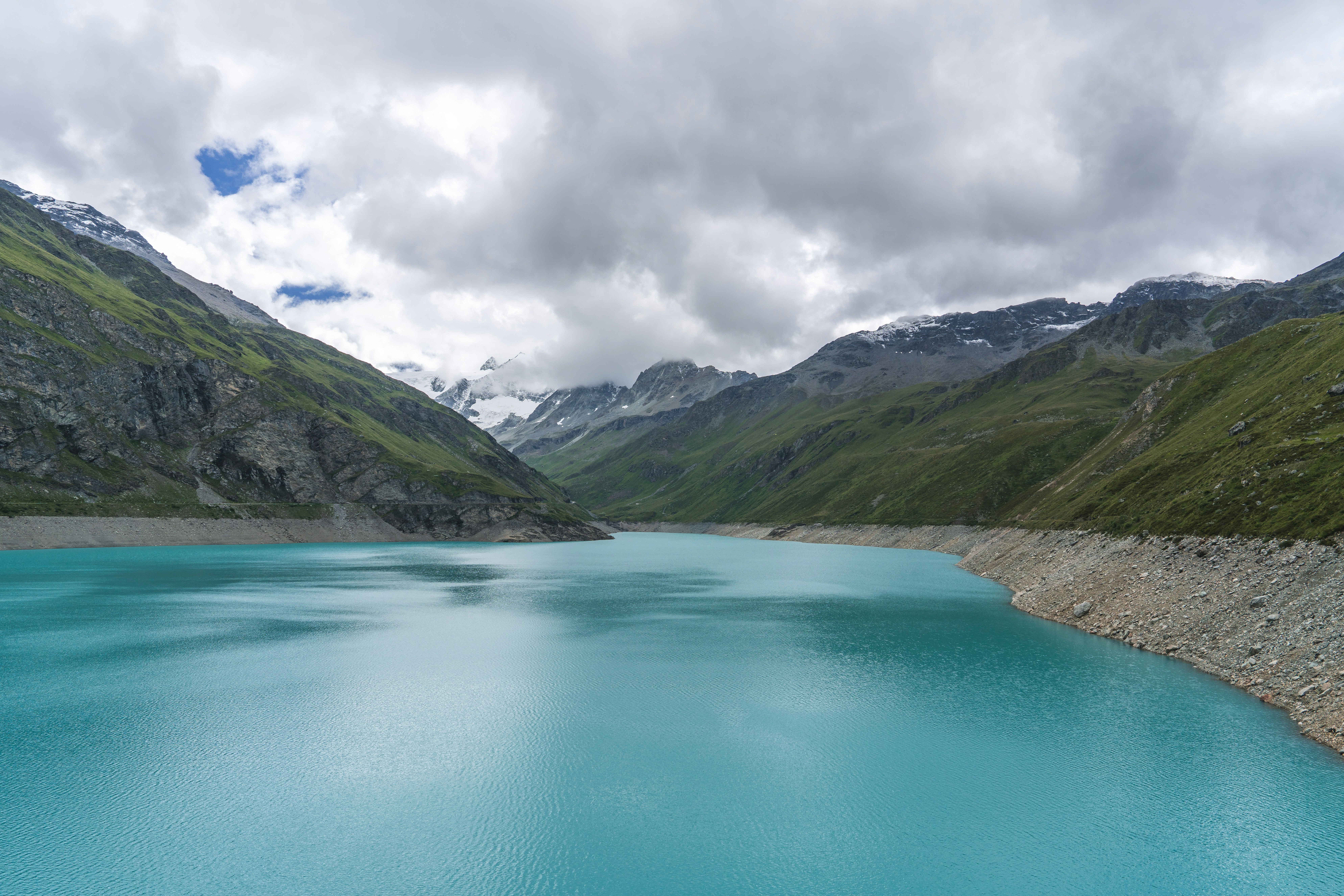 Turquoise Fjord in a Snow-dusted Valleyscape