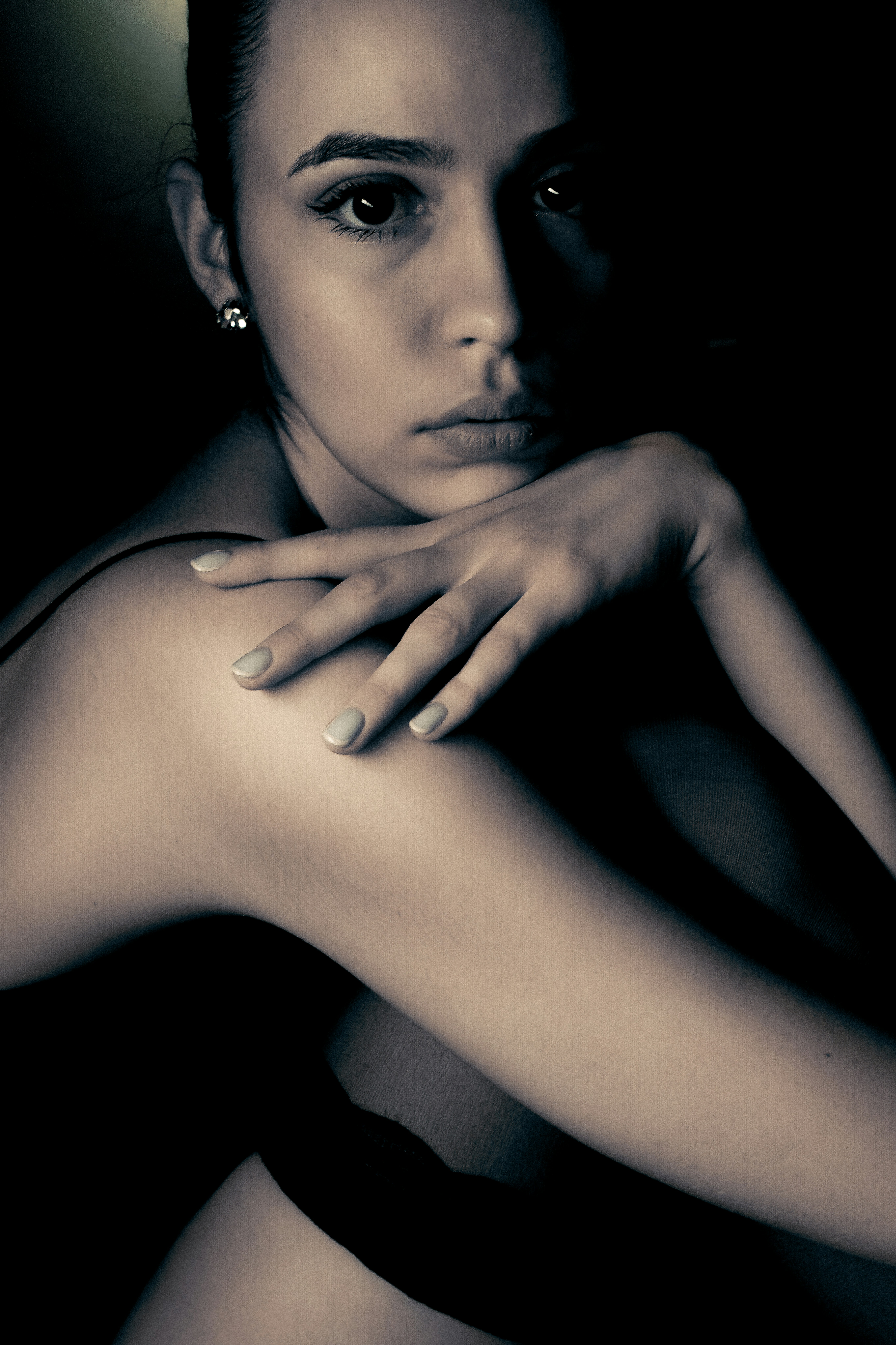 Midnight Gaze: A Quiet Portrait in Shadowed Light