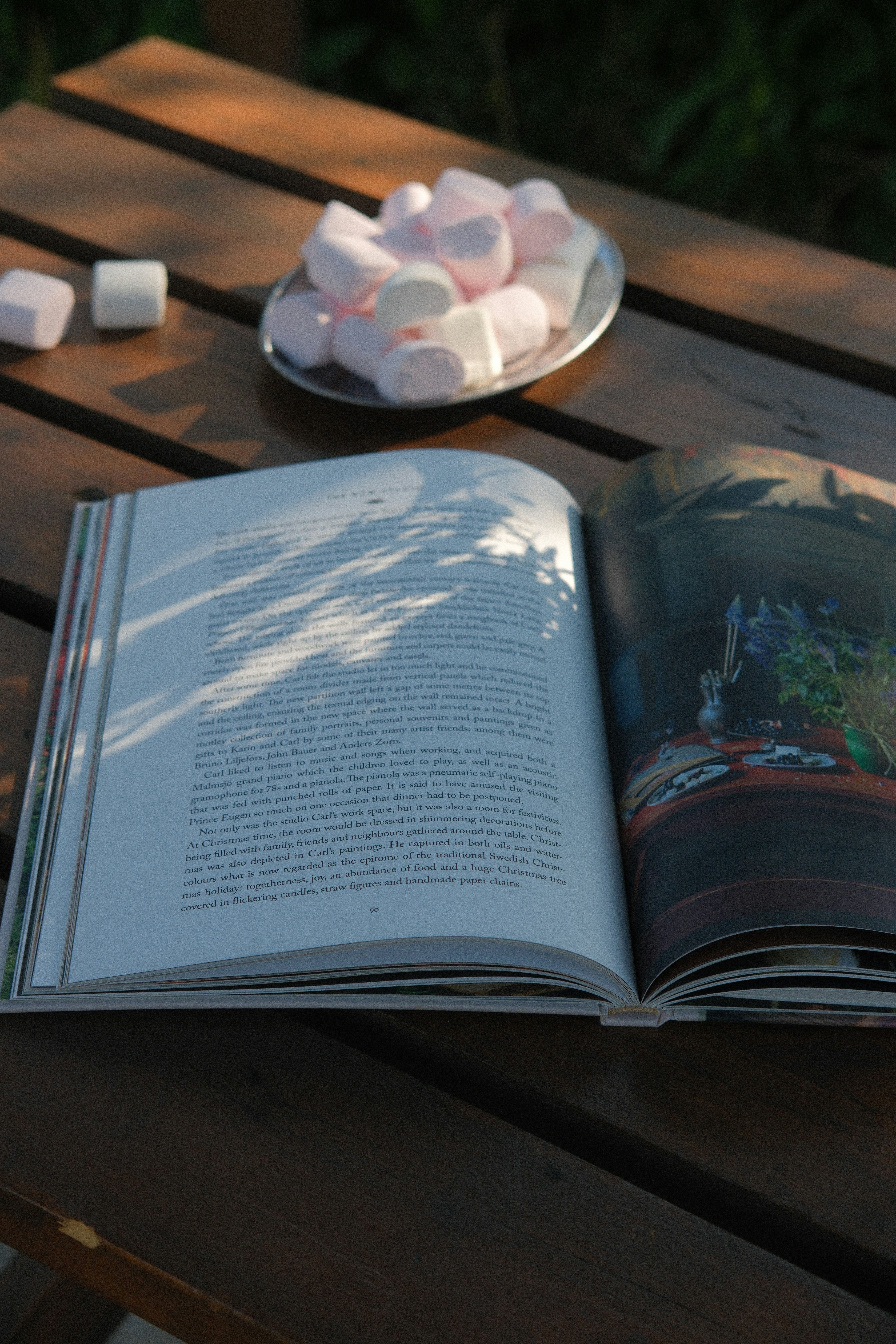 Warm Afternoon: A Relaxed Table Scene with Open Magazine and Marshmallows