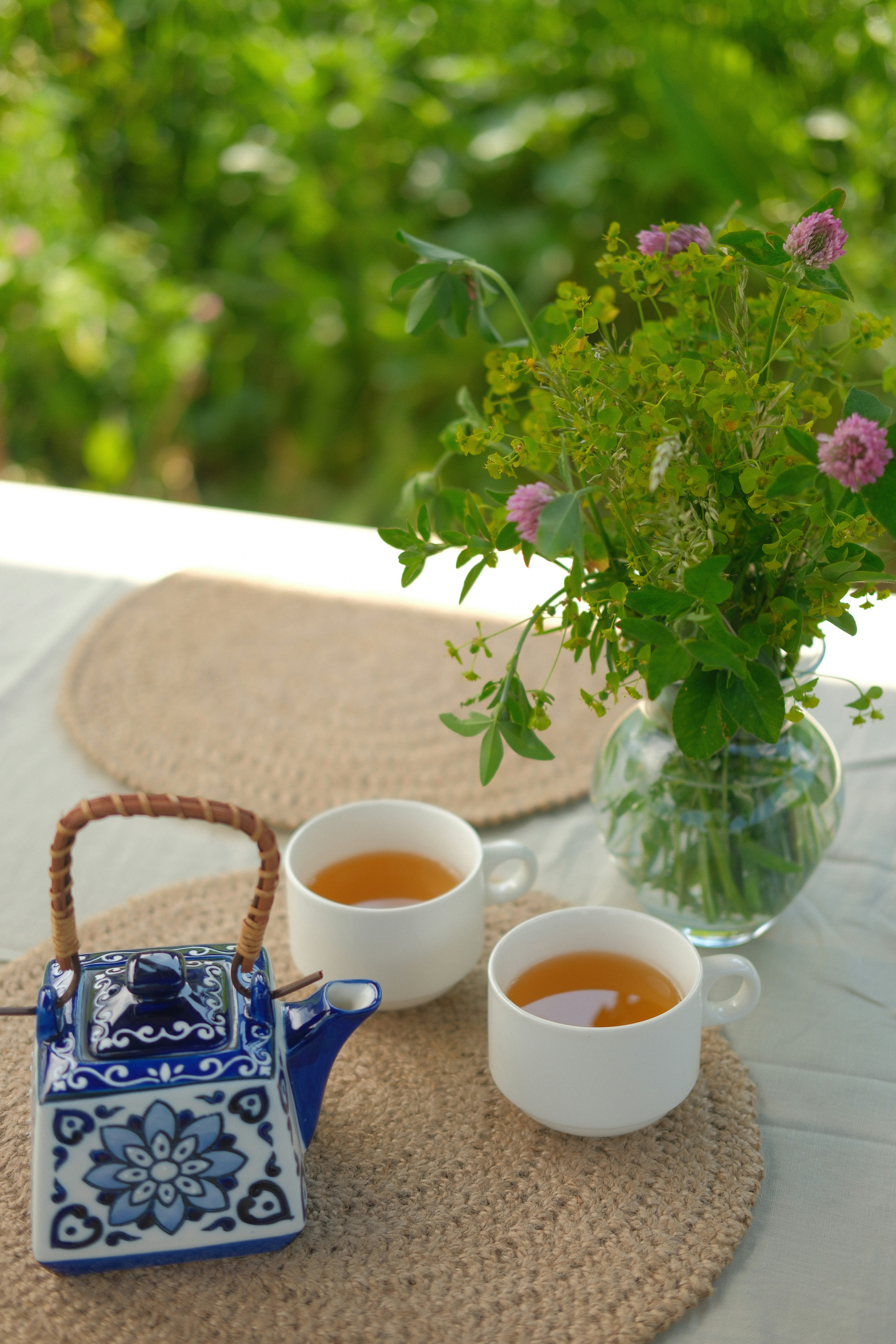 Tea-time in Bloom: A Ceramic Teapot and Fresh Cut Bouquet