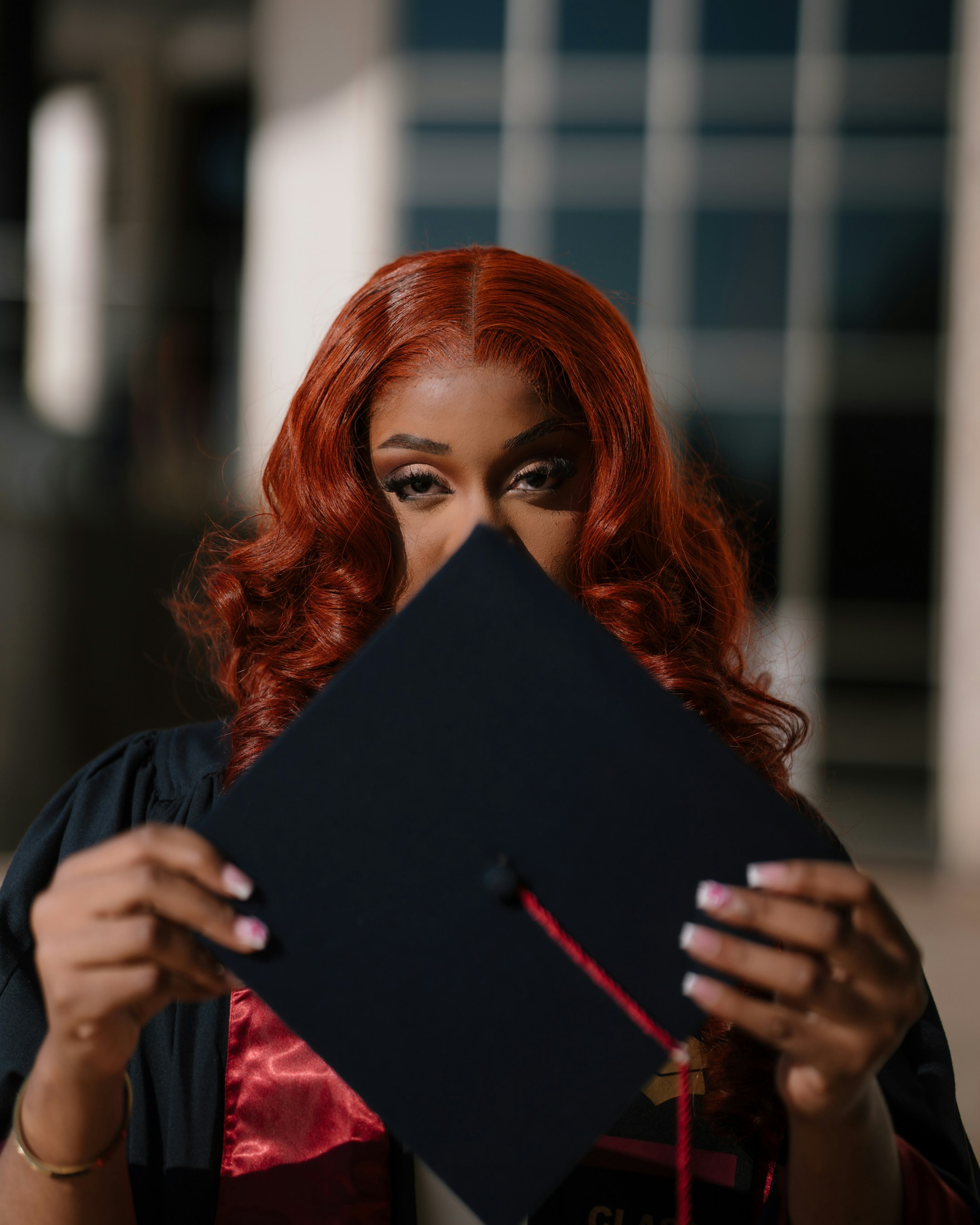 Veil of Graduation: Red Hair under a Dark Cap