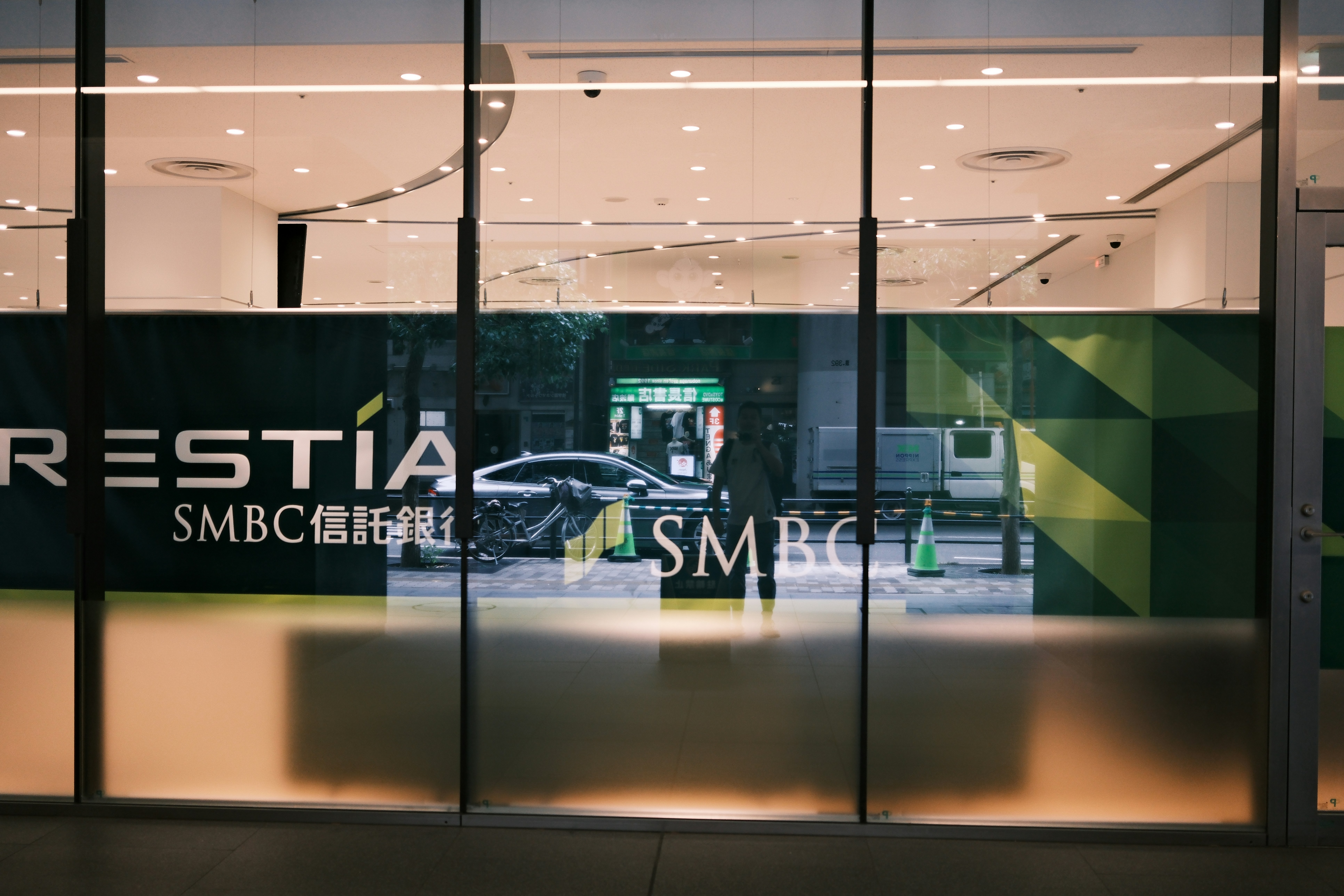 Glass Facade, Banking Hall, and Reflections