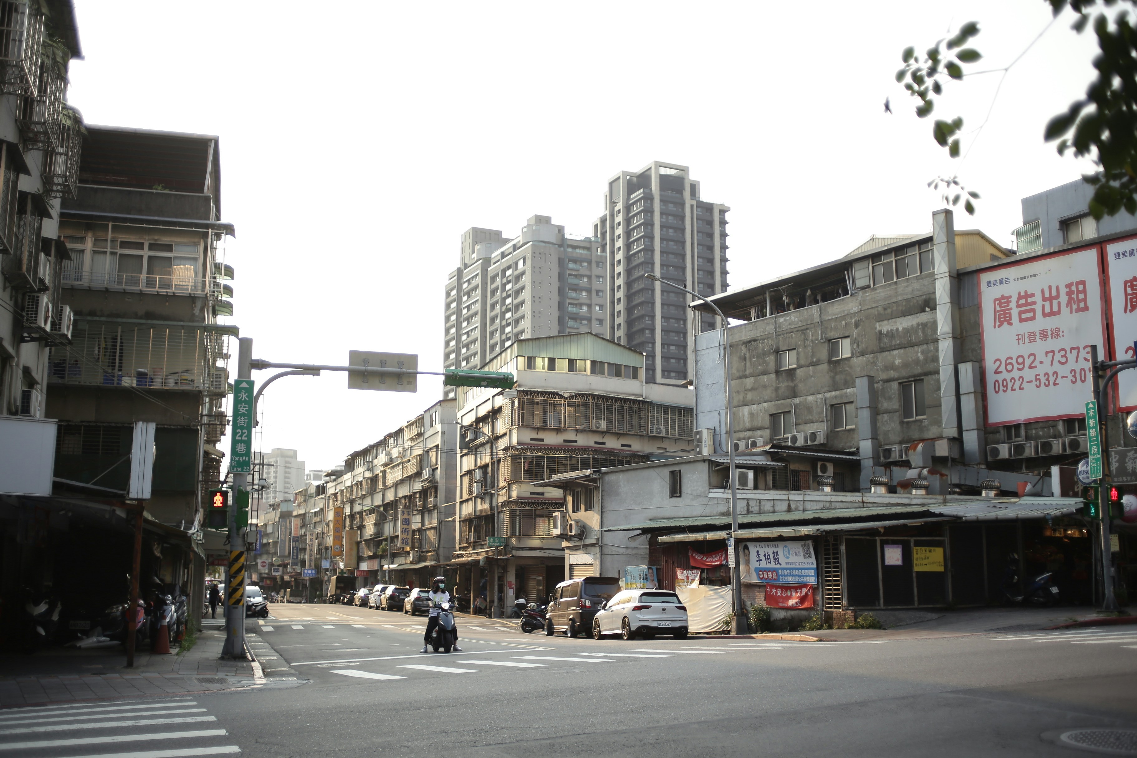 Street Corridor: Morning Light Over a Densely Built Chinatown Arcade