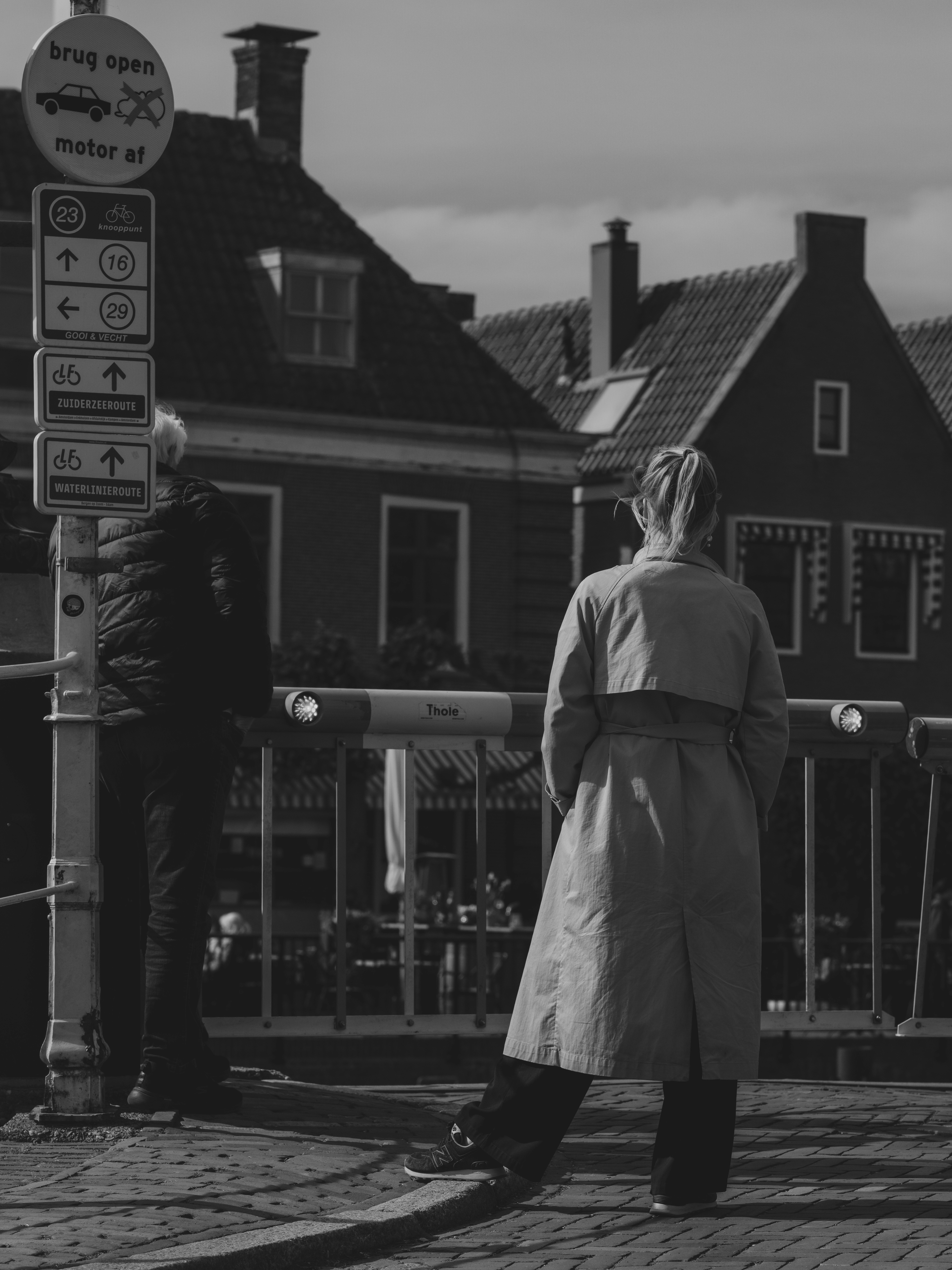 Waiting at the Canal Gate: A Quiet Edge of the Street
