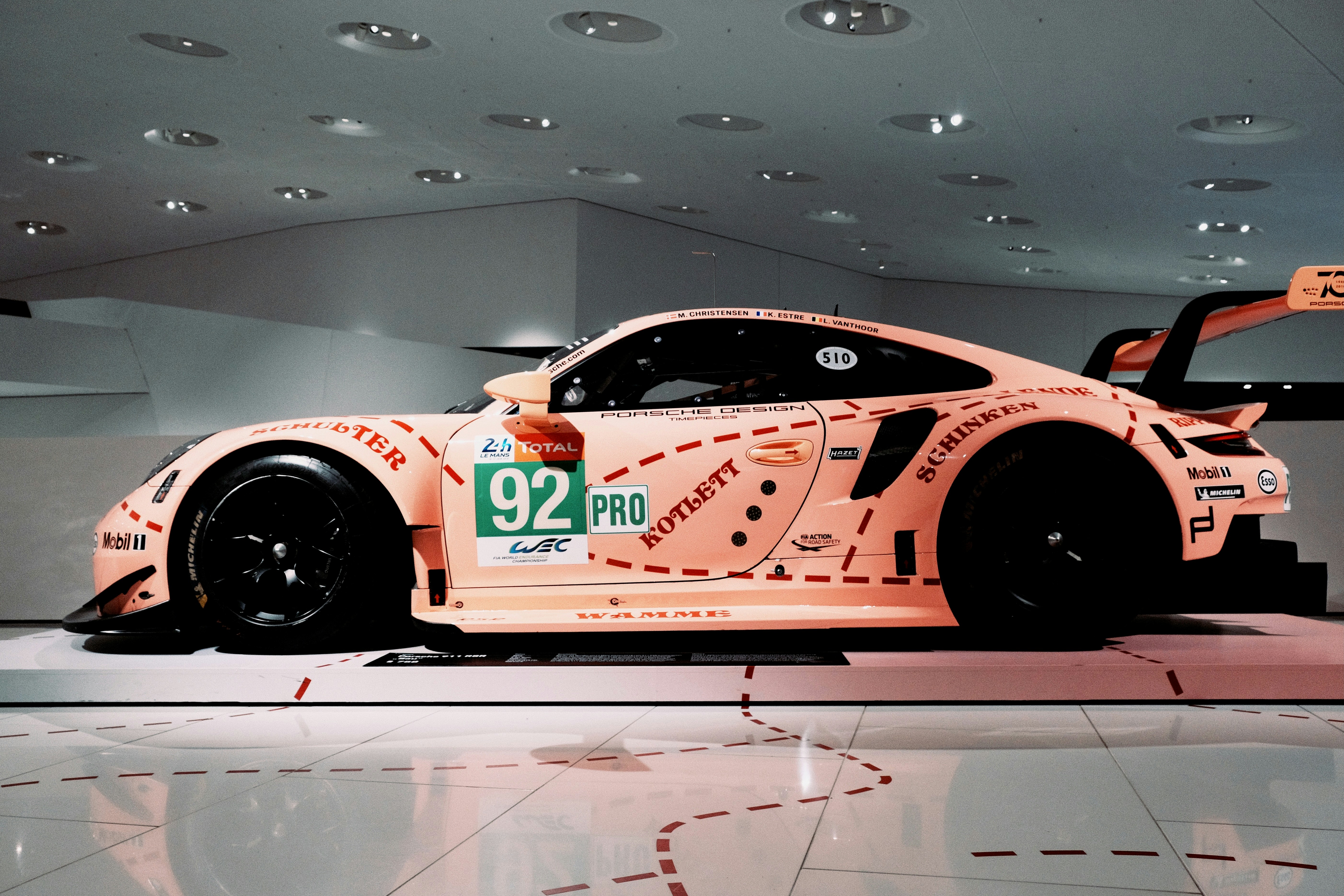 Pale Racer in a Neon Gallery: The Pink GT Masterpiece