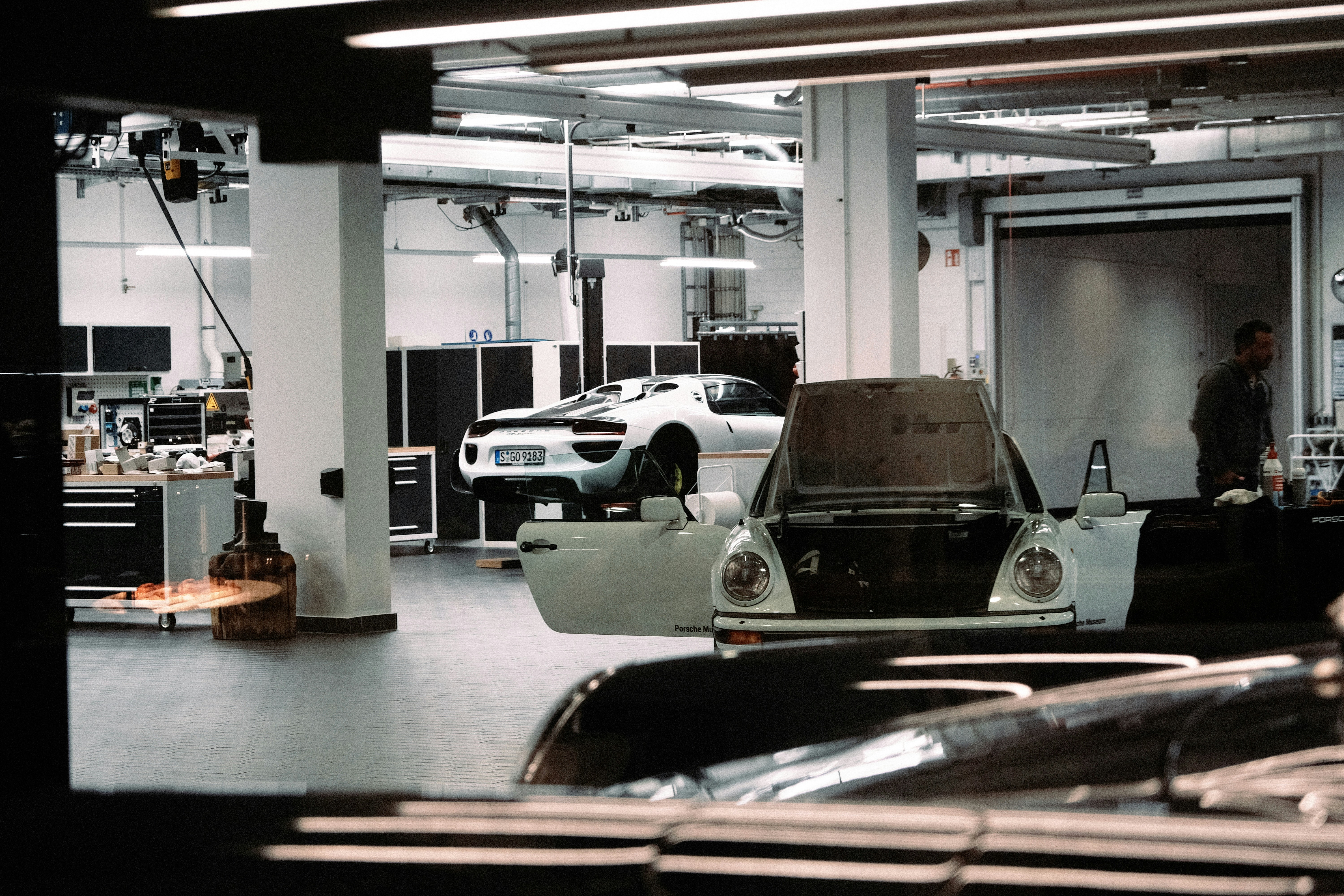 Open-Front Coupe in a Quiet Service Bay