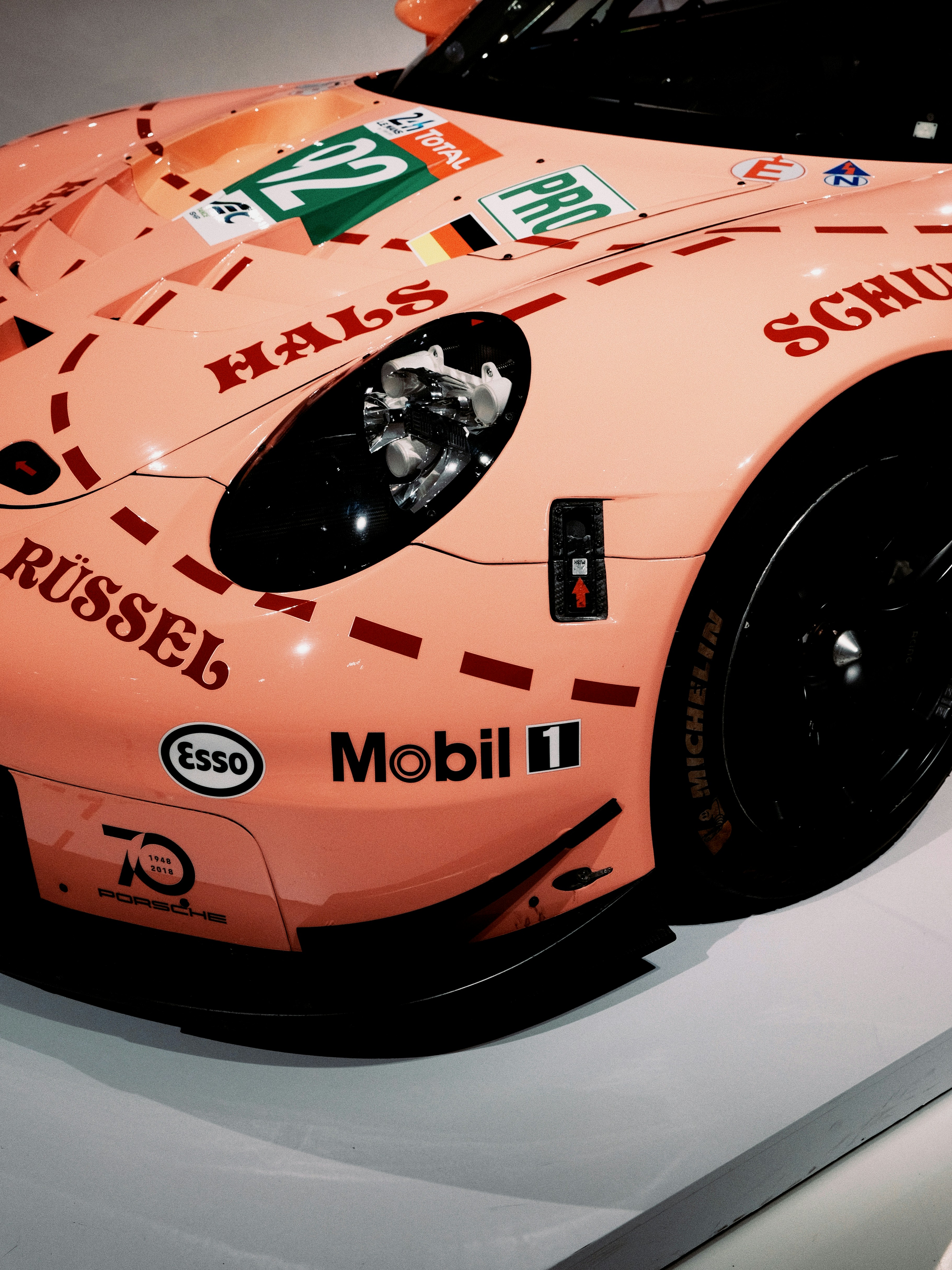 Peach Racing: Front Corner of a Classic Livery Porsche