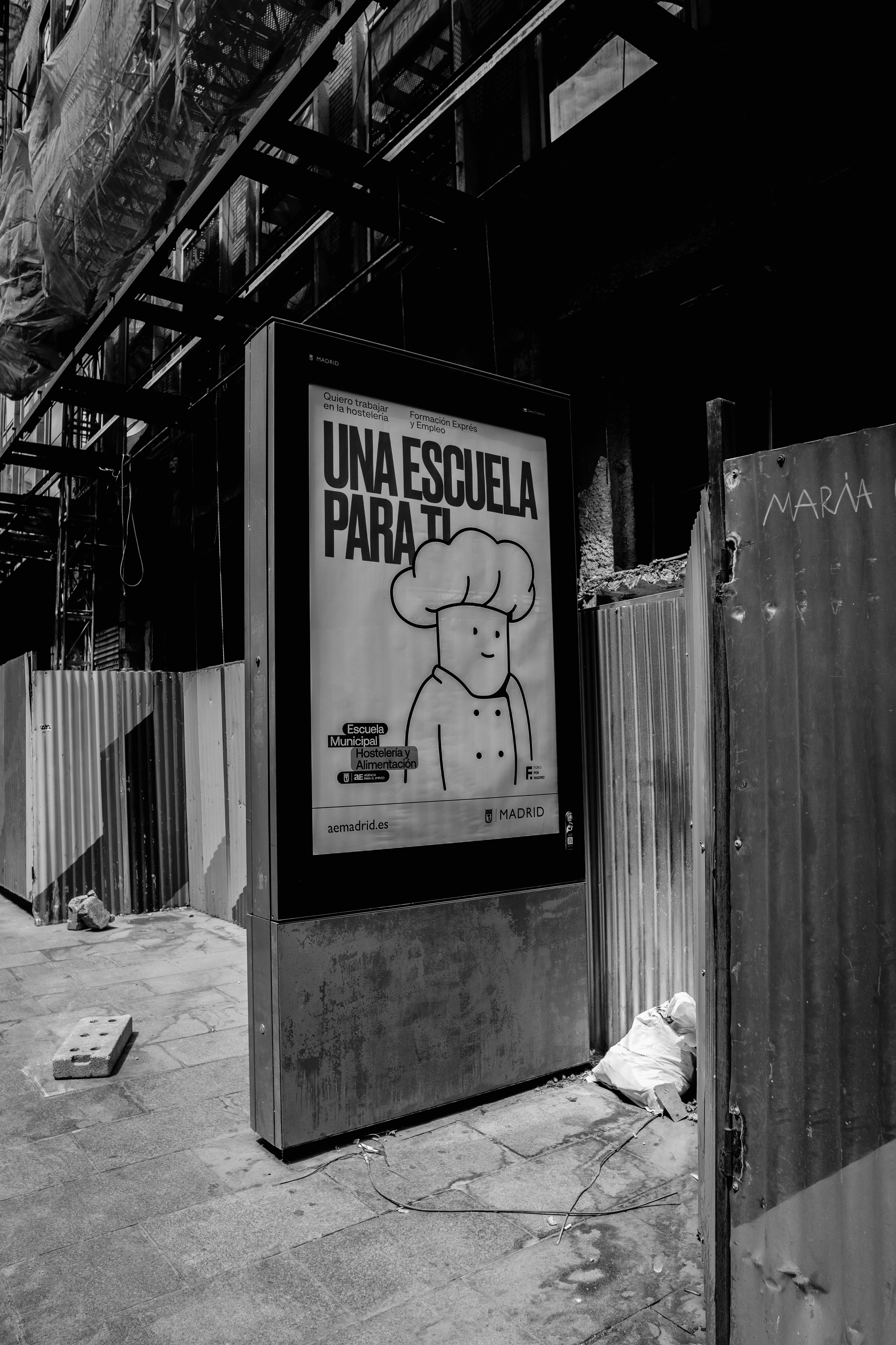 Urban Construction Silent Scene: A Cheery Billboard Amid Dusked Scaffolding