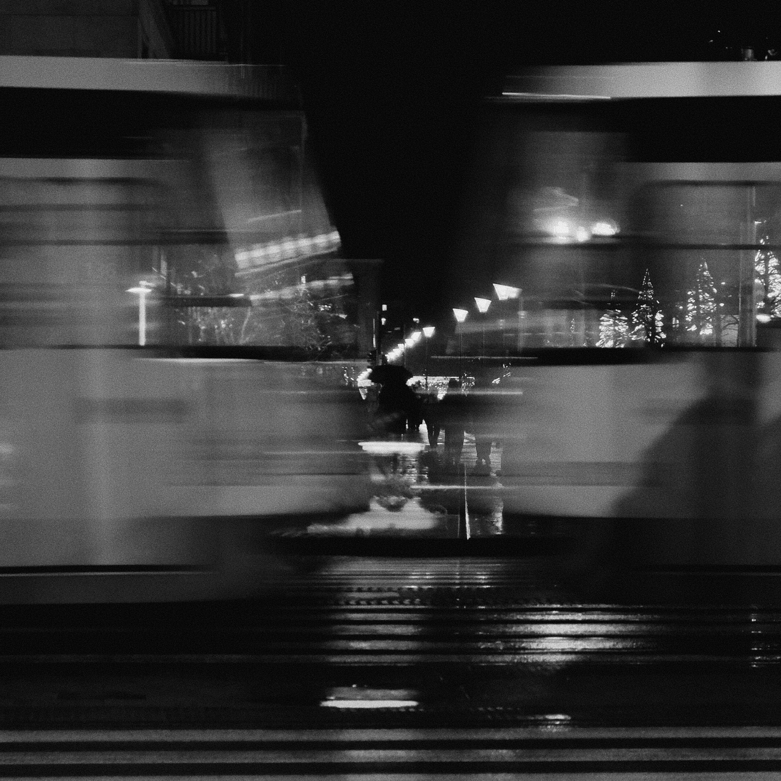 Midnight Transit: A Blurred Glass of Urban Movement