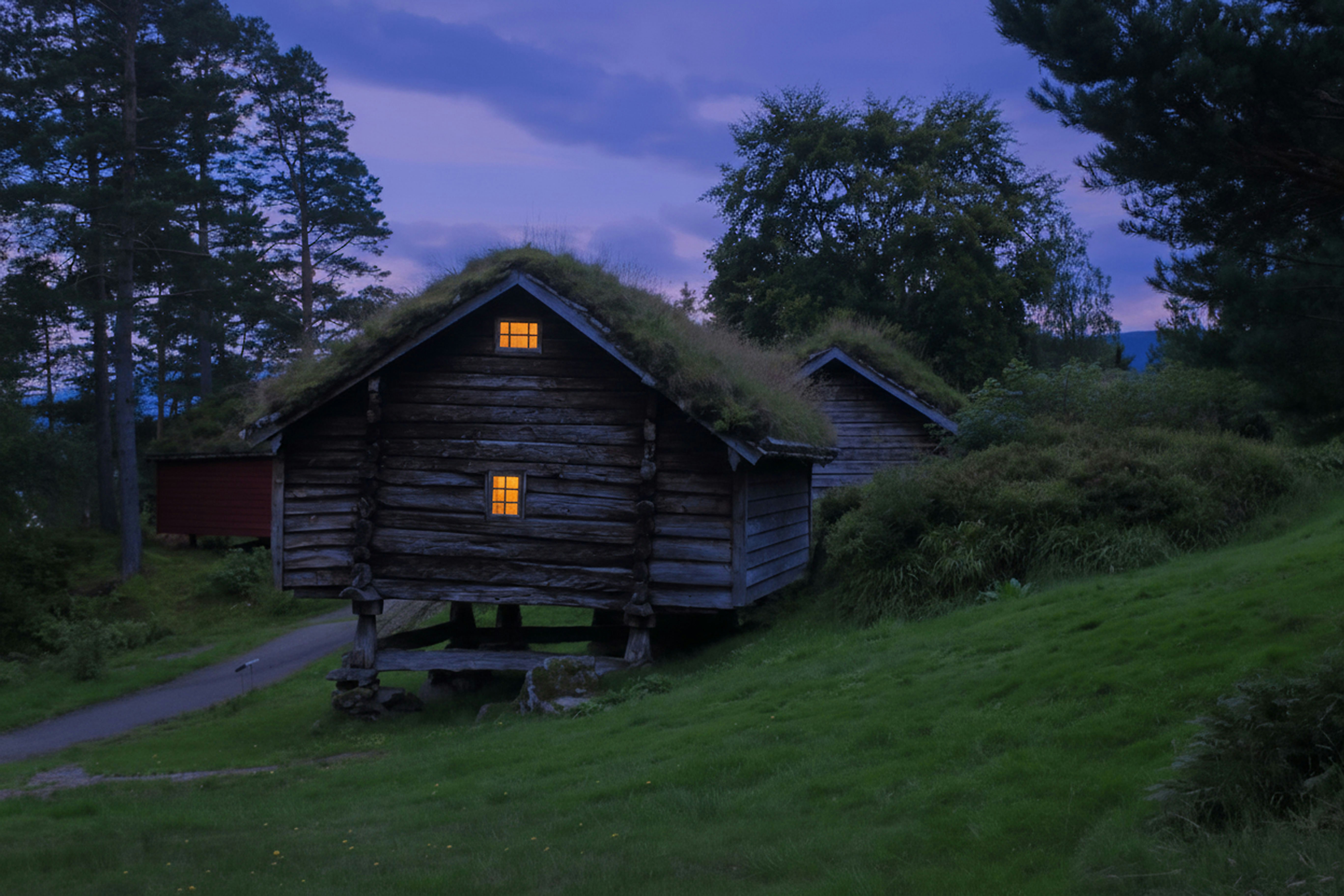 Warm glow in a dusk-charmed alpine hut