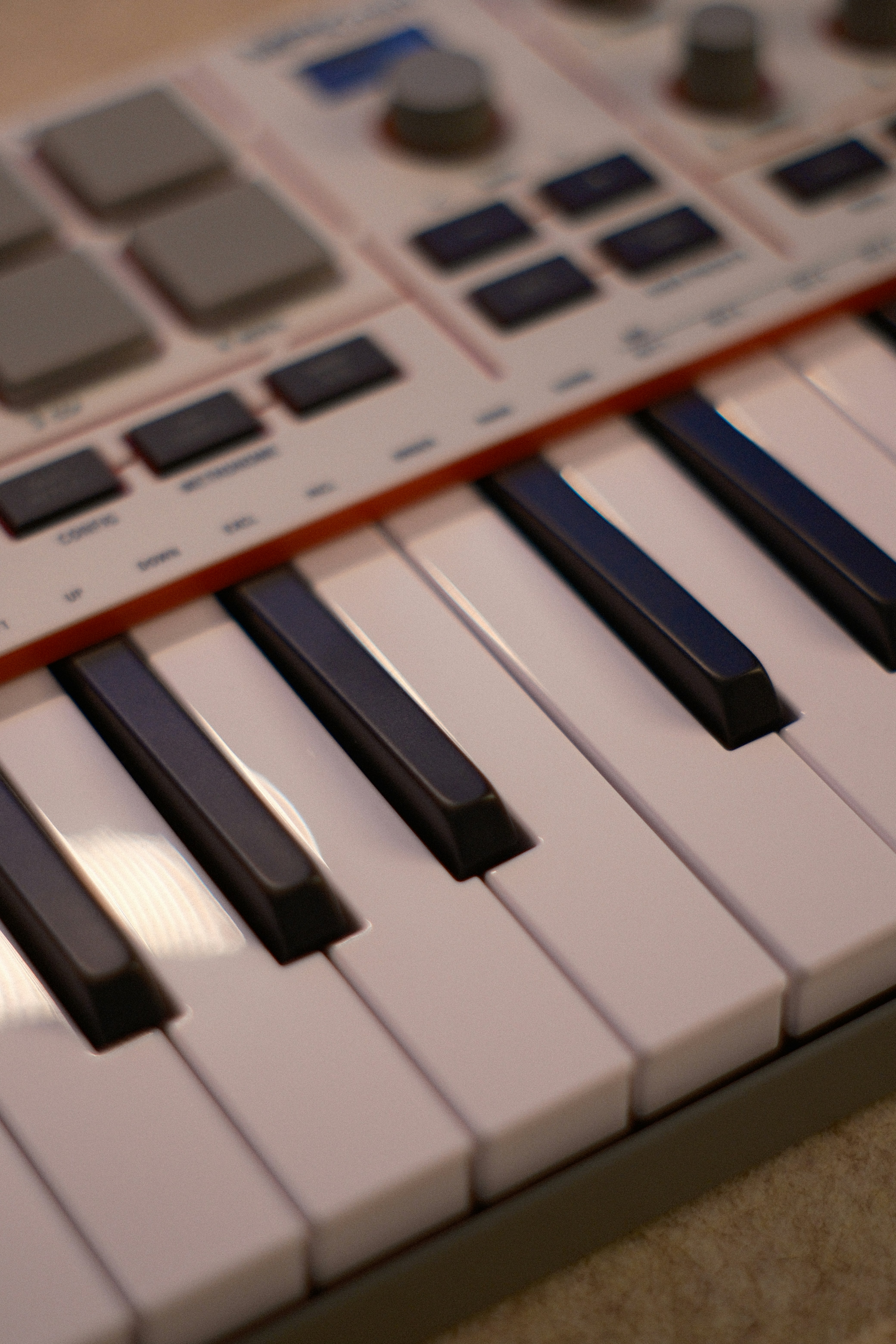 Keys in Focus: A Close-Up of Piano Keyboard with Analog Pad Controller