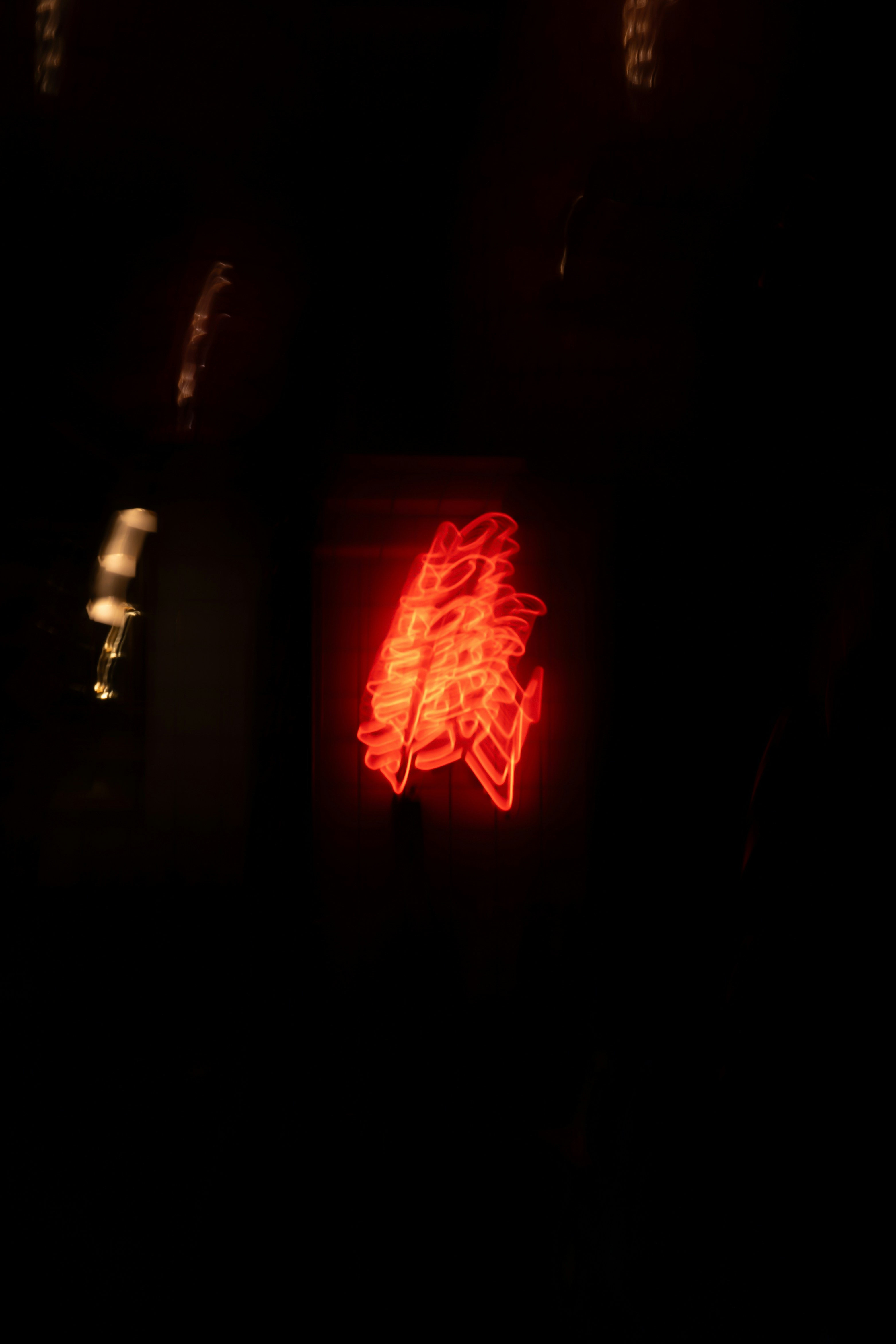 Neon Sign in the Darkness
