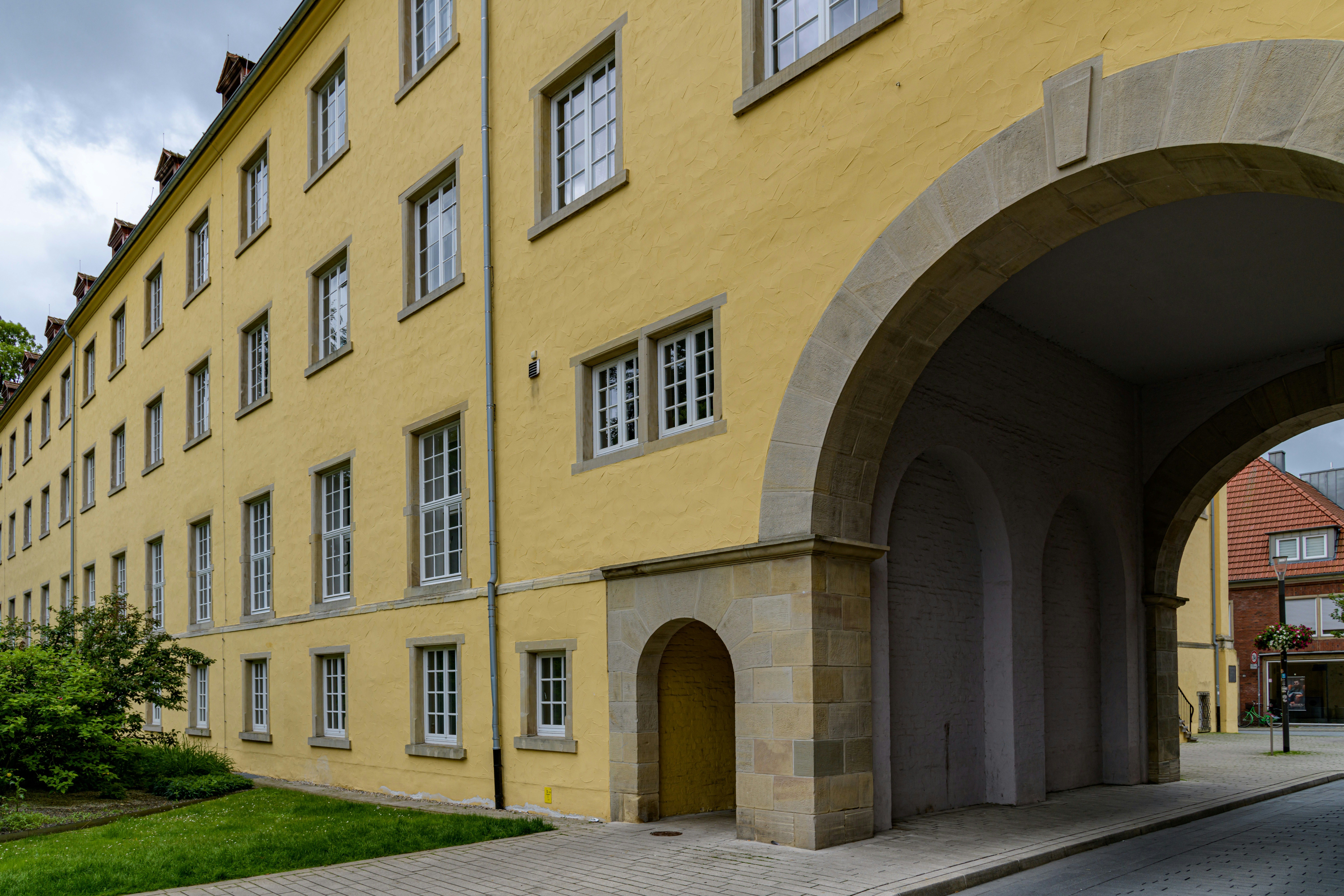 Yellow Court Archway: A Quiet Campus Walkway