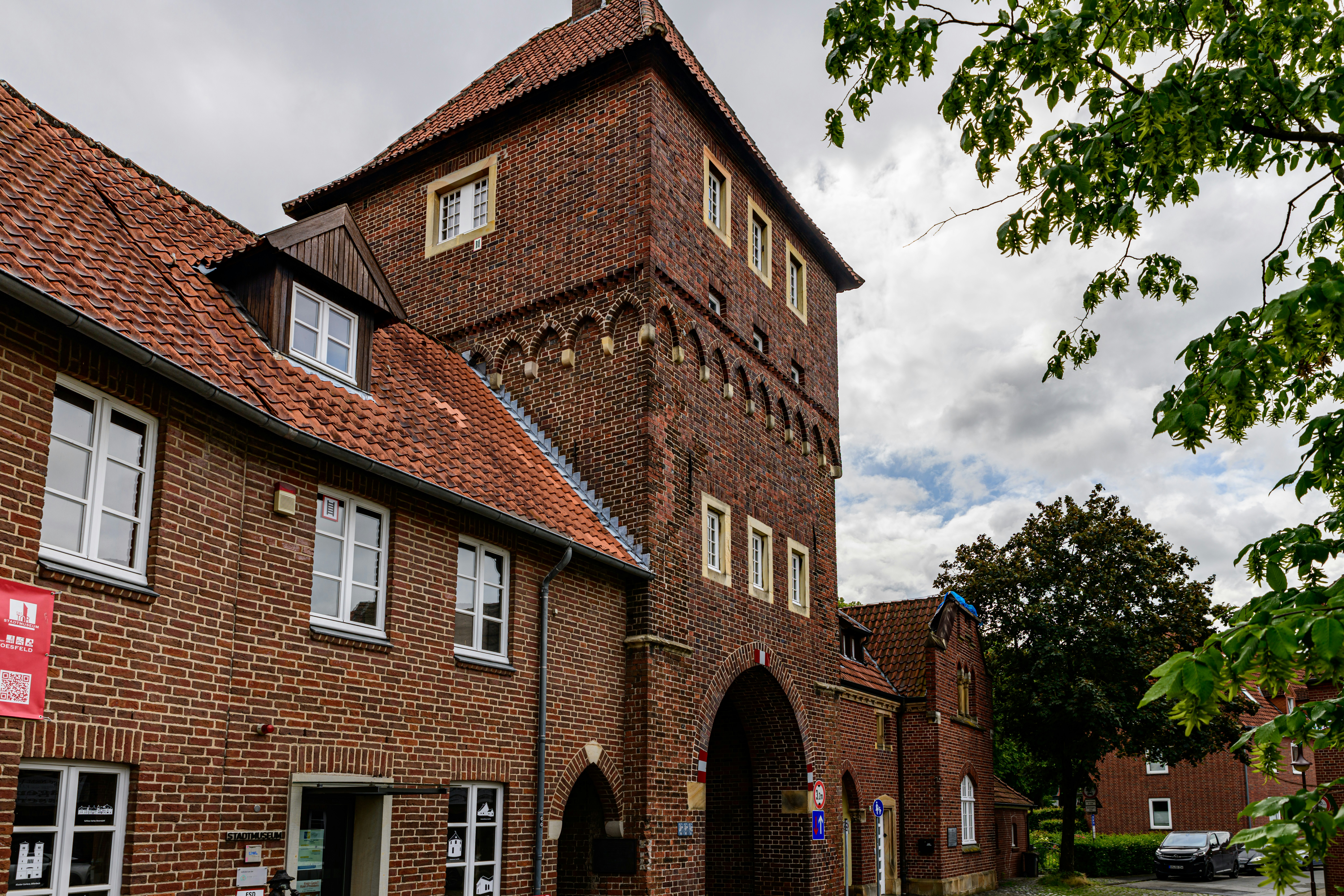 Brick Gateway Tower under a Shaded Sky
