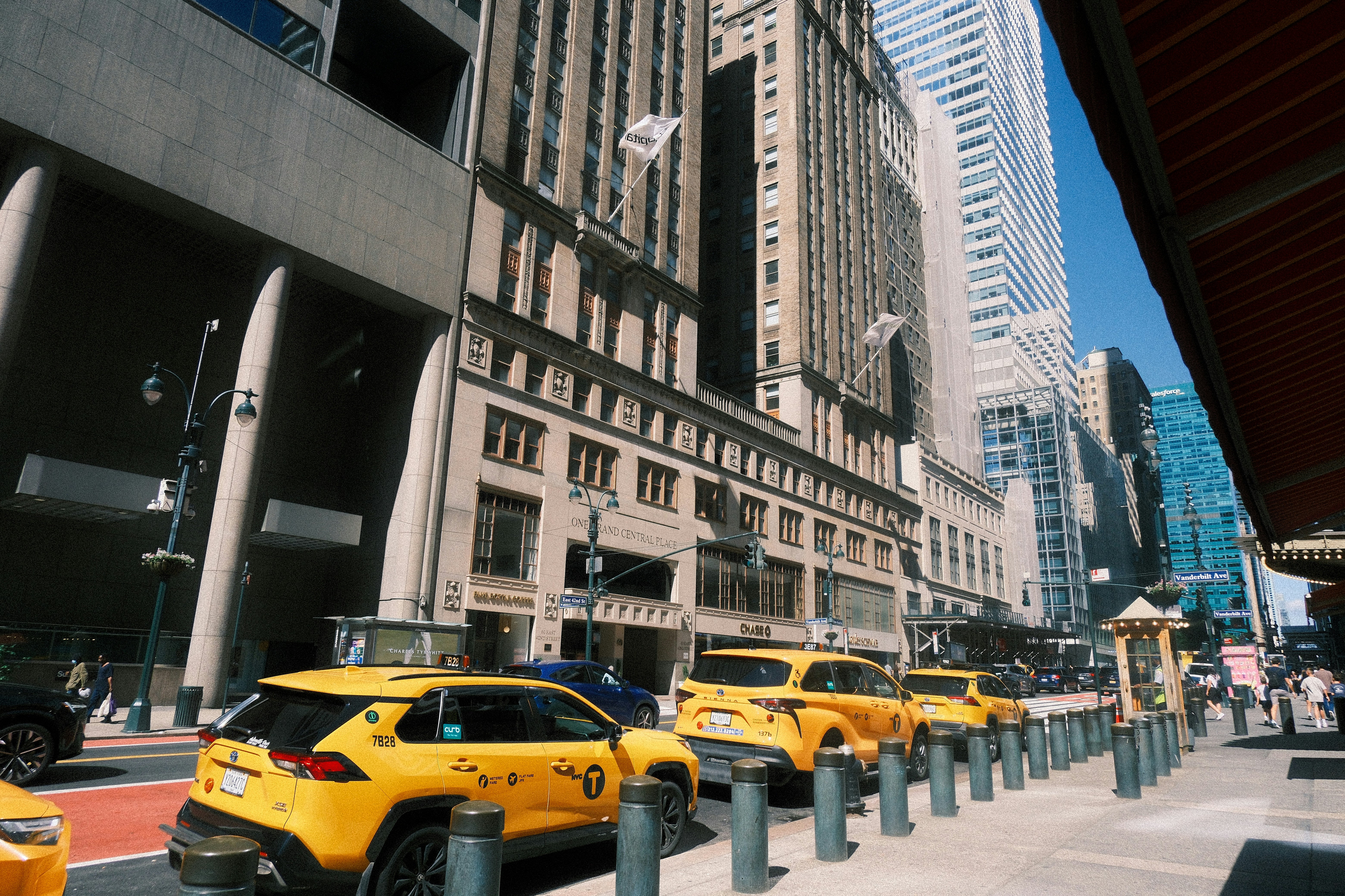 Yellow Cabs at a Midtown Crosswalk