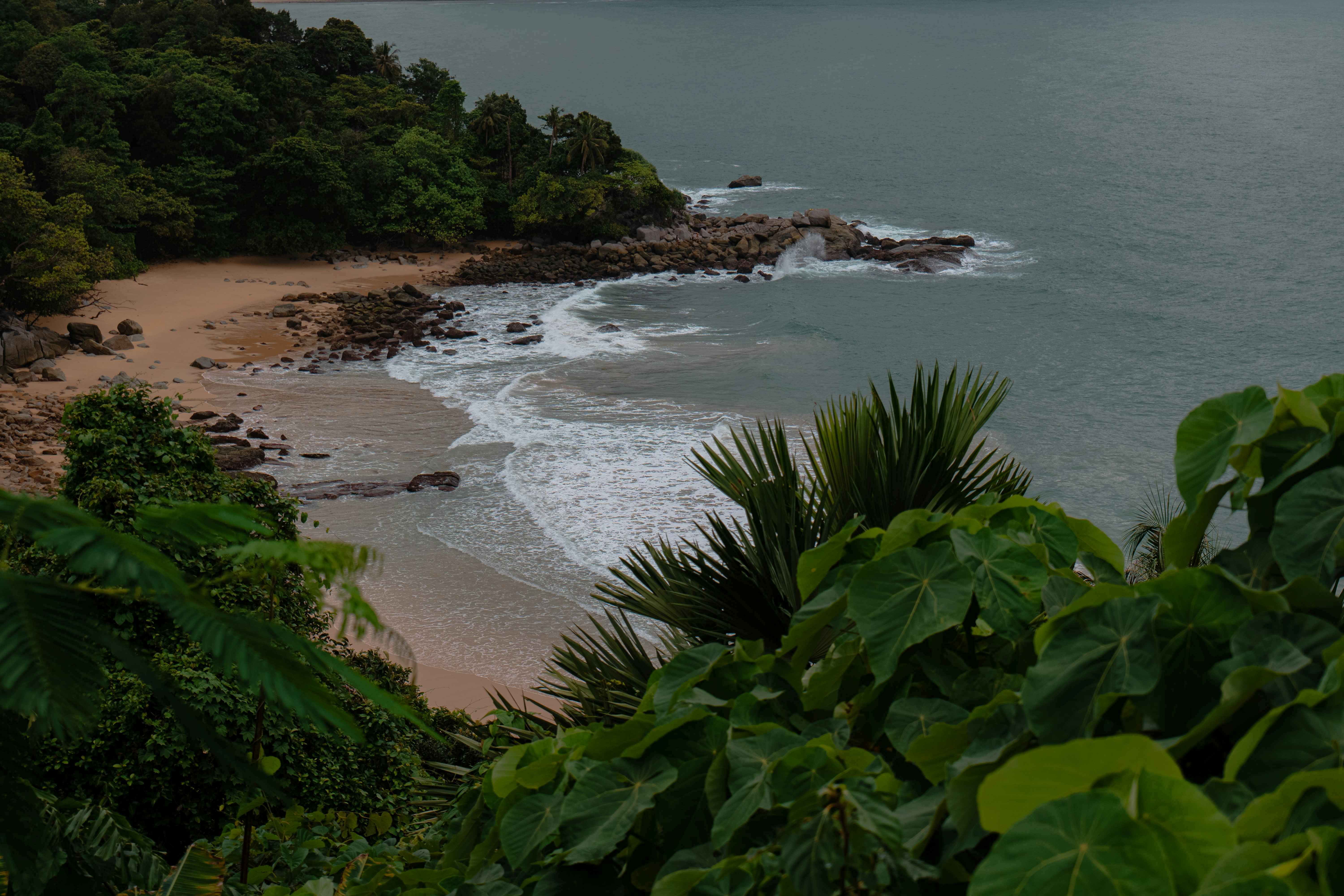 High Angle View of Rocky Tropical Shoreline and Waves