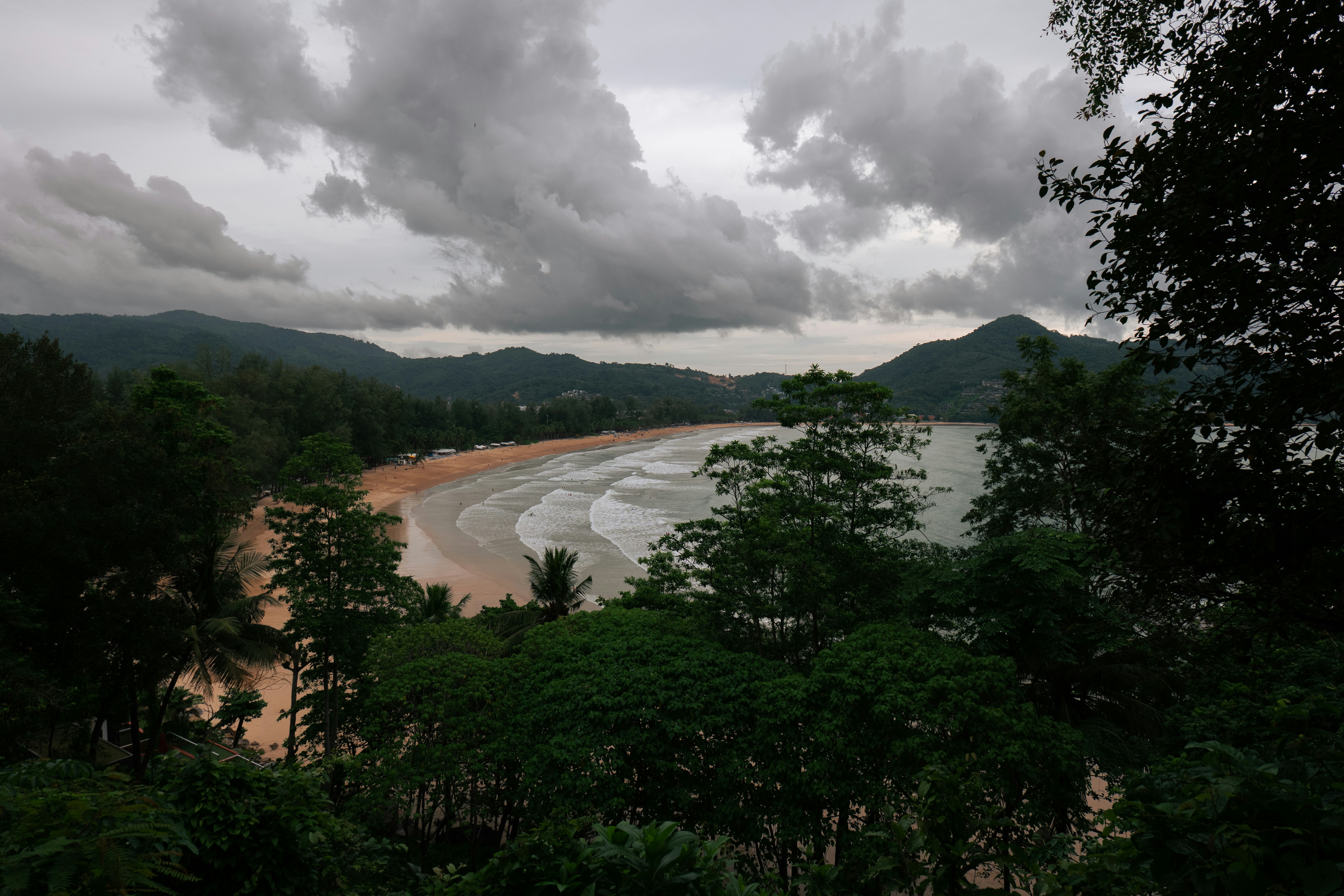 Dramatic Storm Clouds Over Tropical Beach Bay