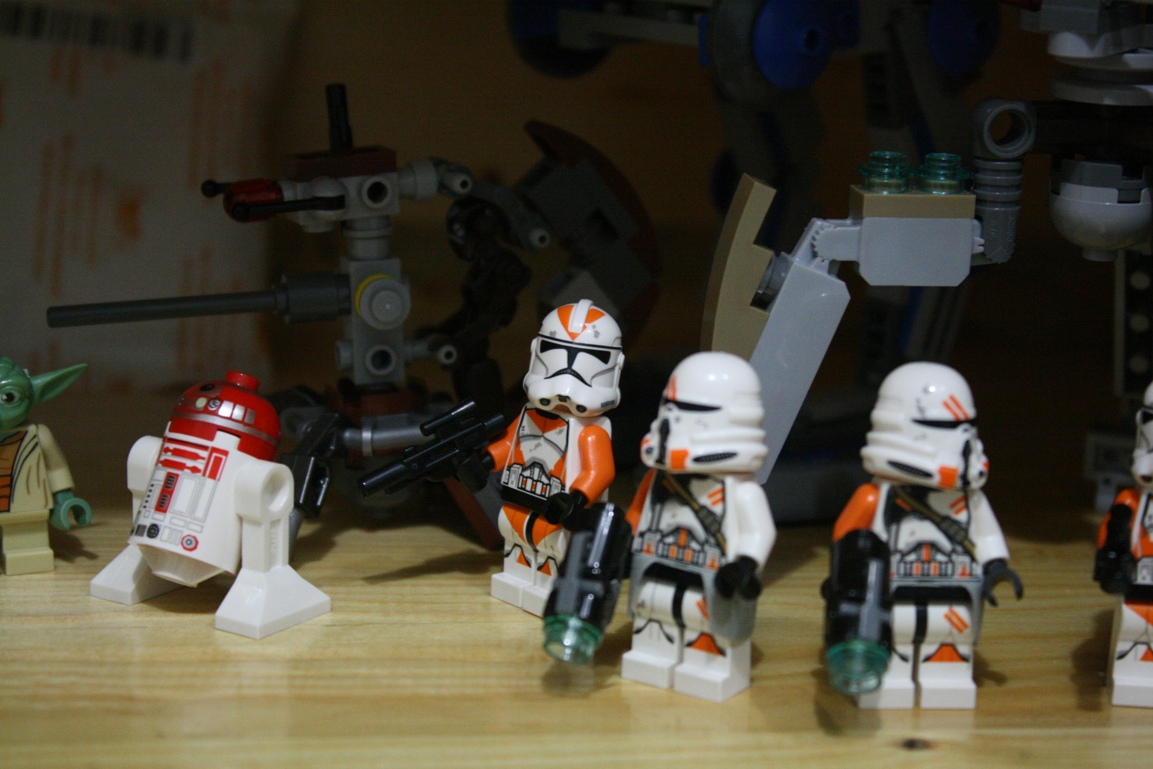 Miniature Frontline: White-armored troopers at a cluttered shelf of space gear
