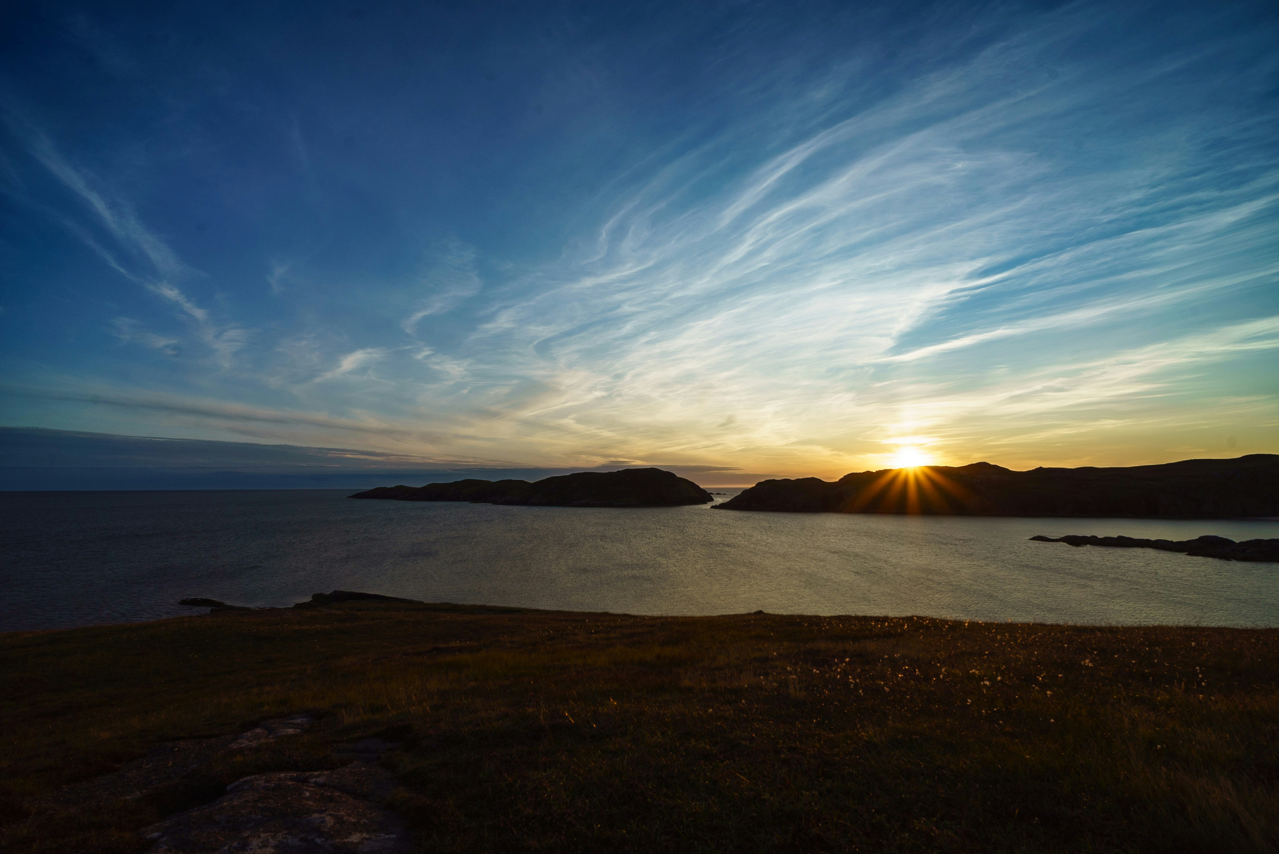Sunlit Ridge: A Quiet Shore at Dusk