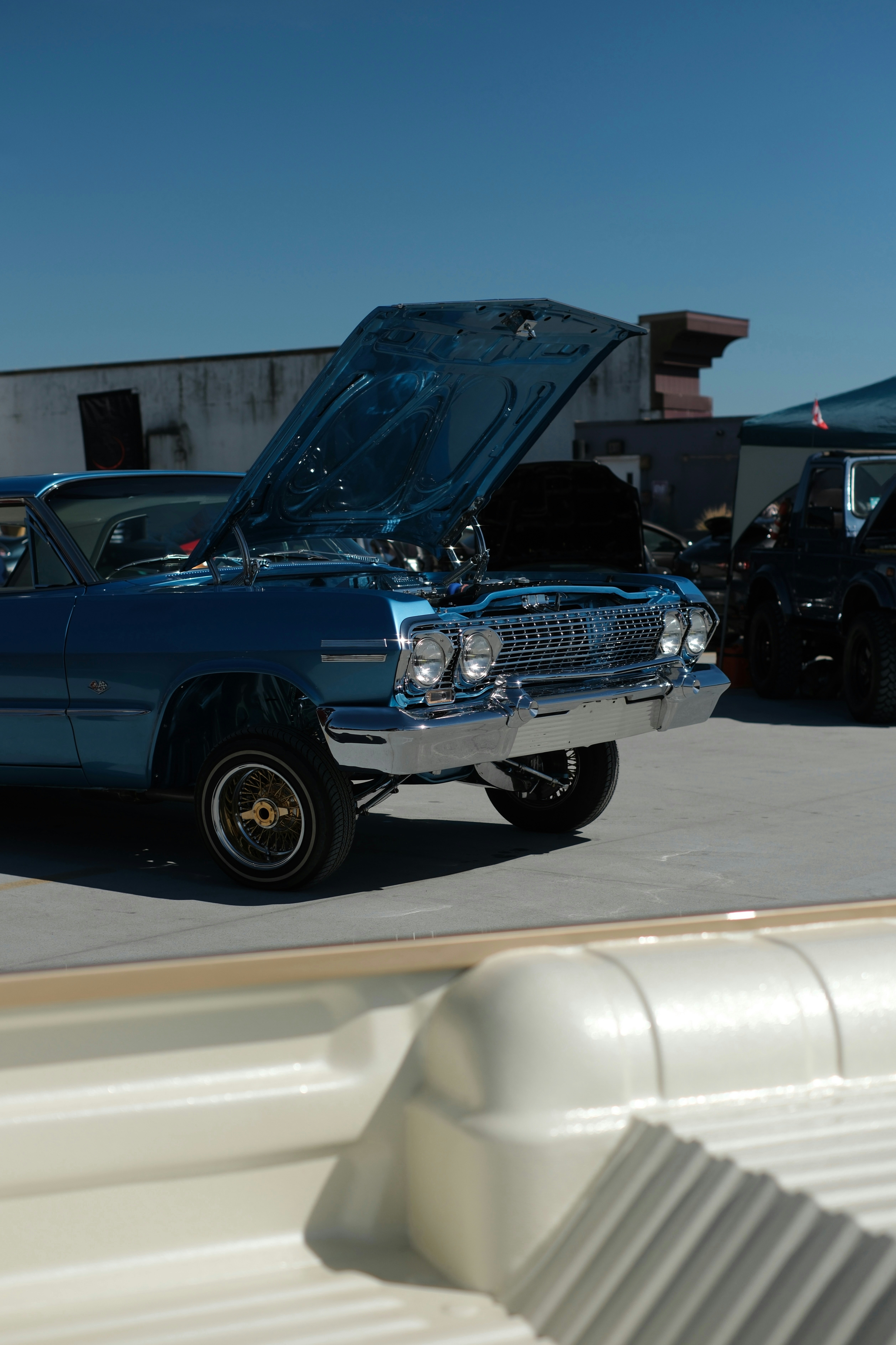 Blue Classic: Grille, Hood Up, under a Clear Sky