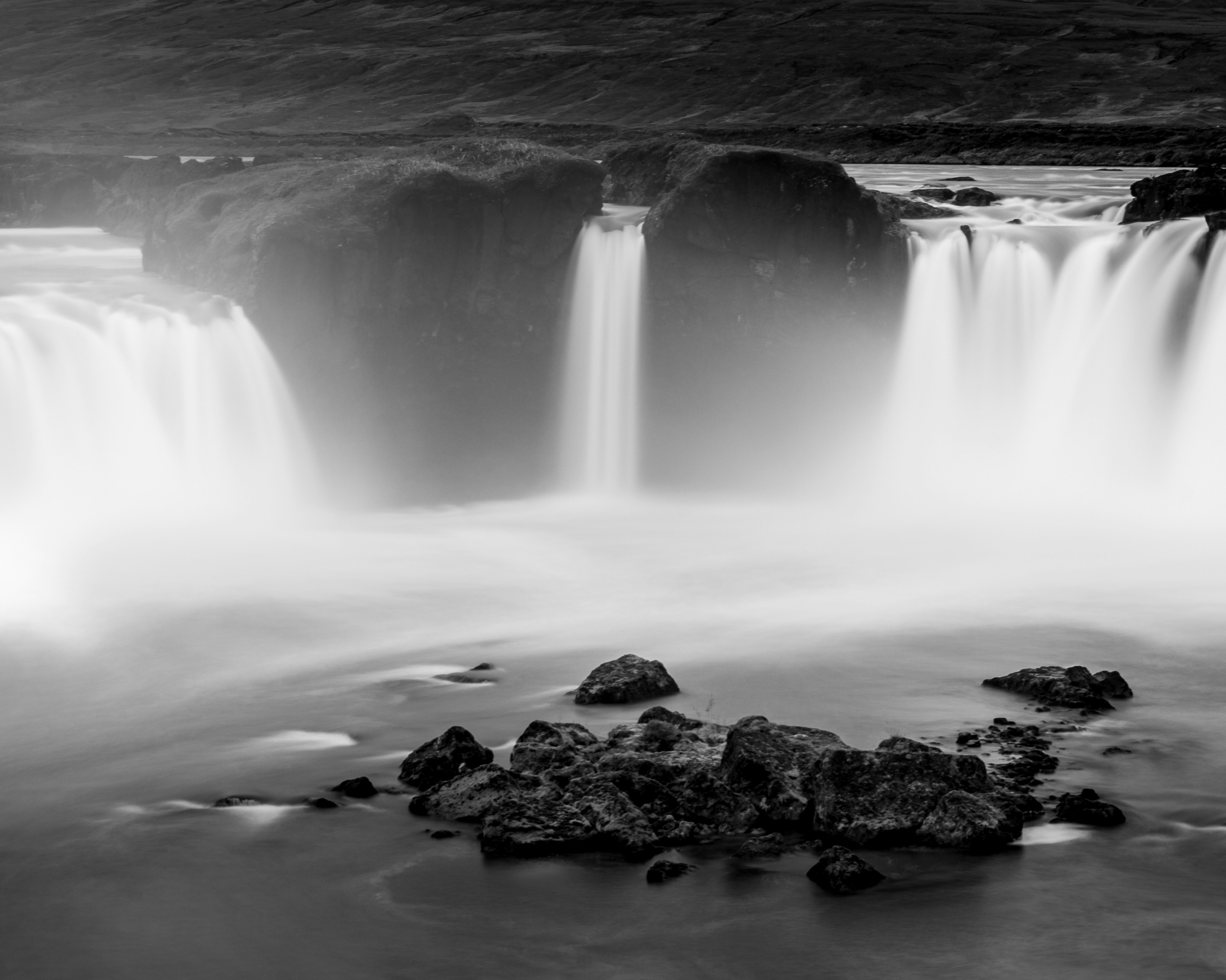 Veil of Silence over a Midnight Cascade