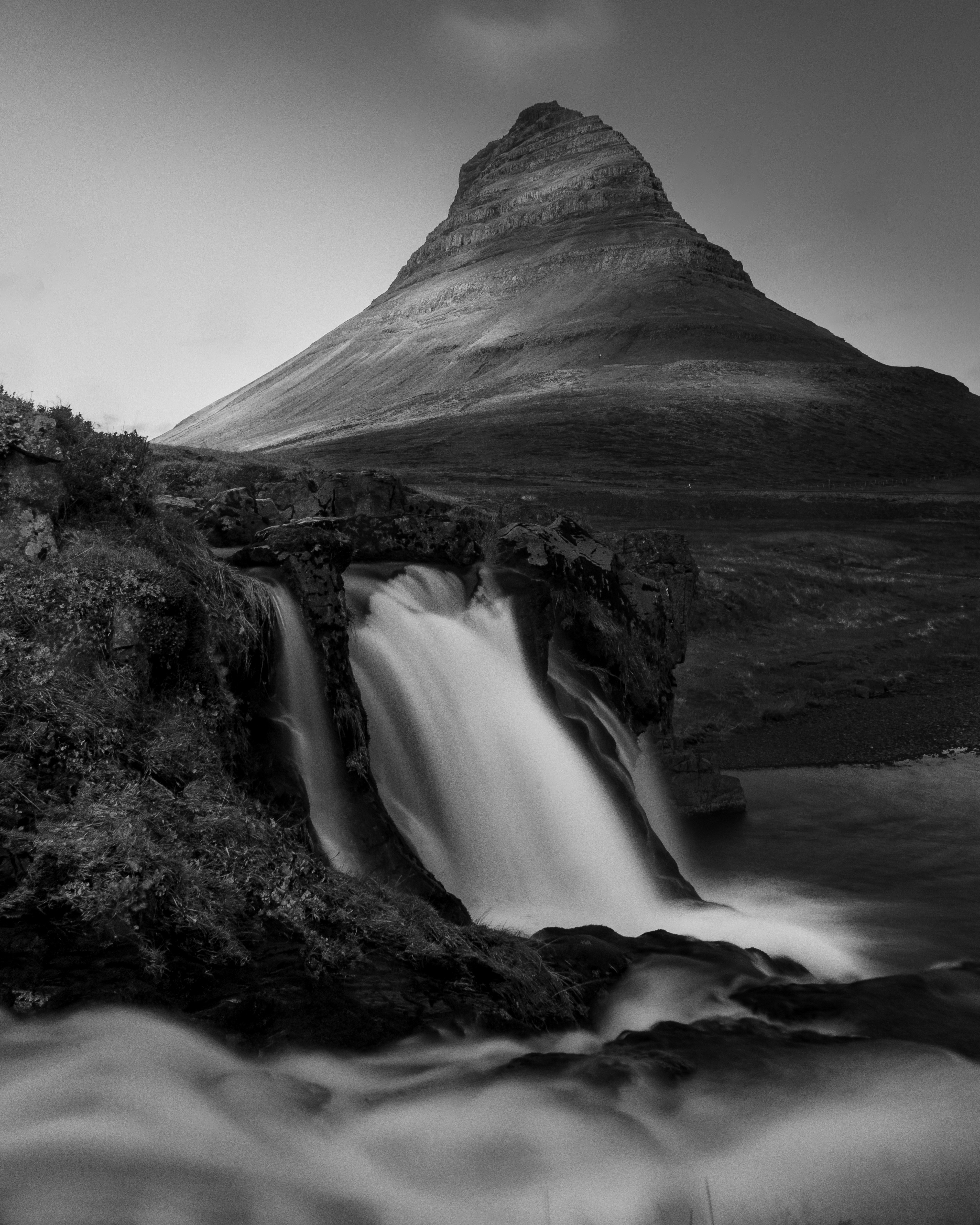 Icelandic Peak Above a Cascading Veil