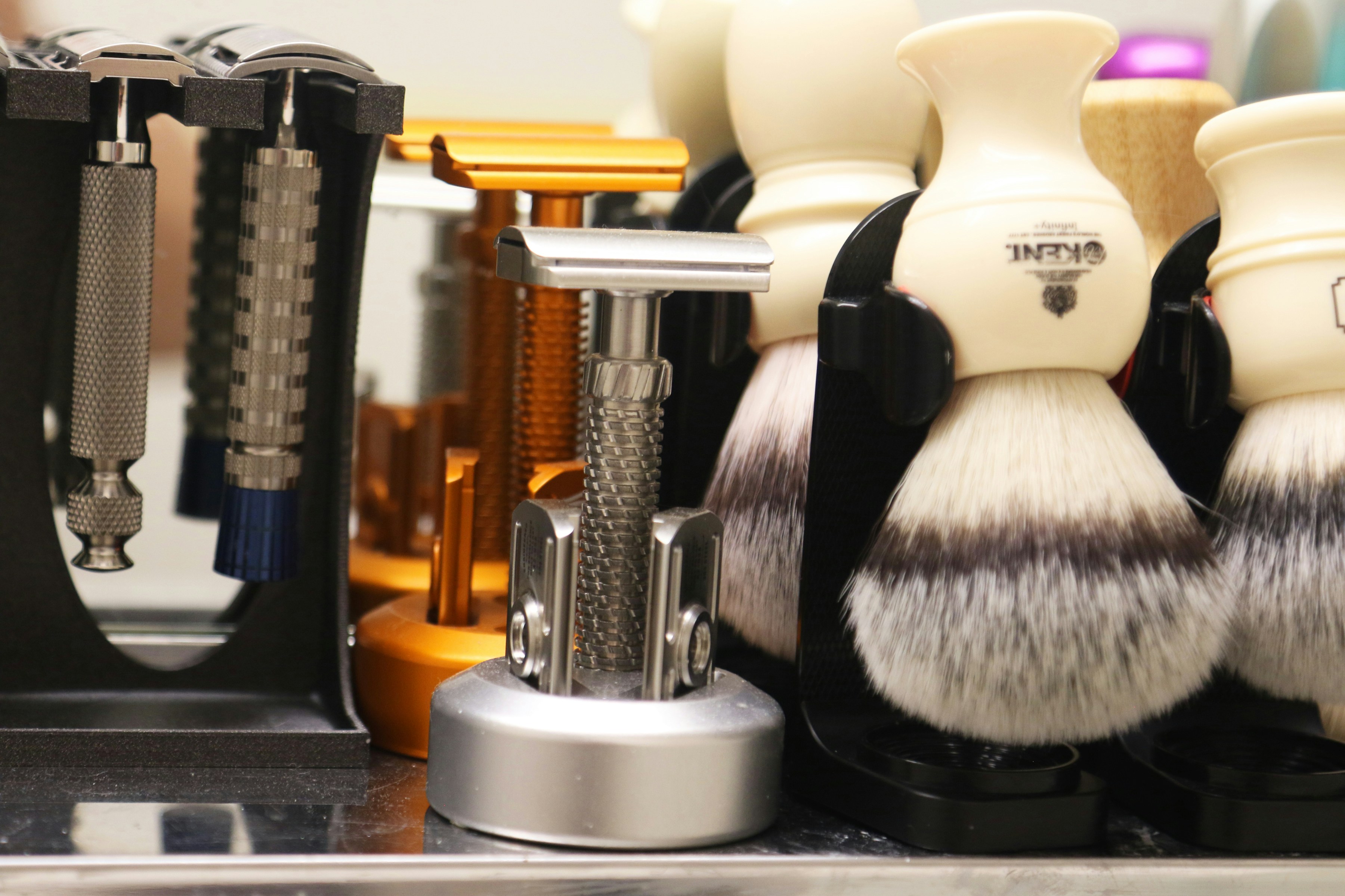 Industrial Precision: Close-Up of Razor Heads and Shaving Brushes
