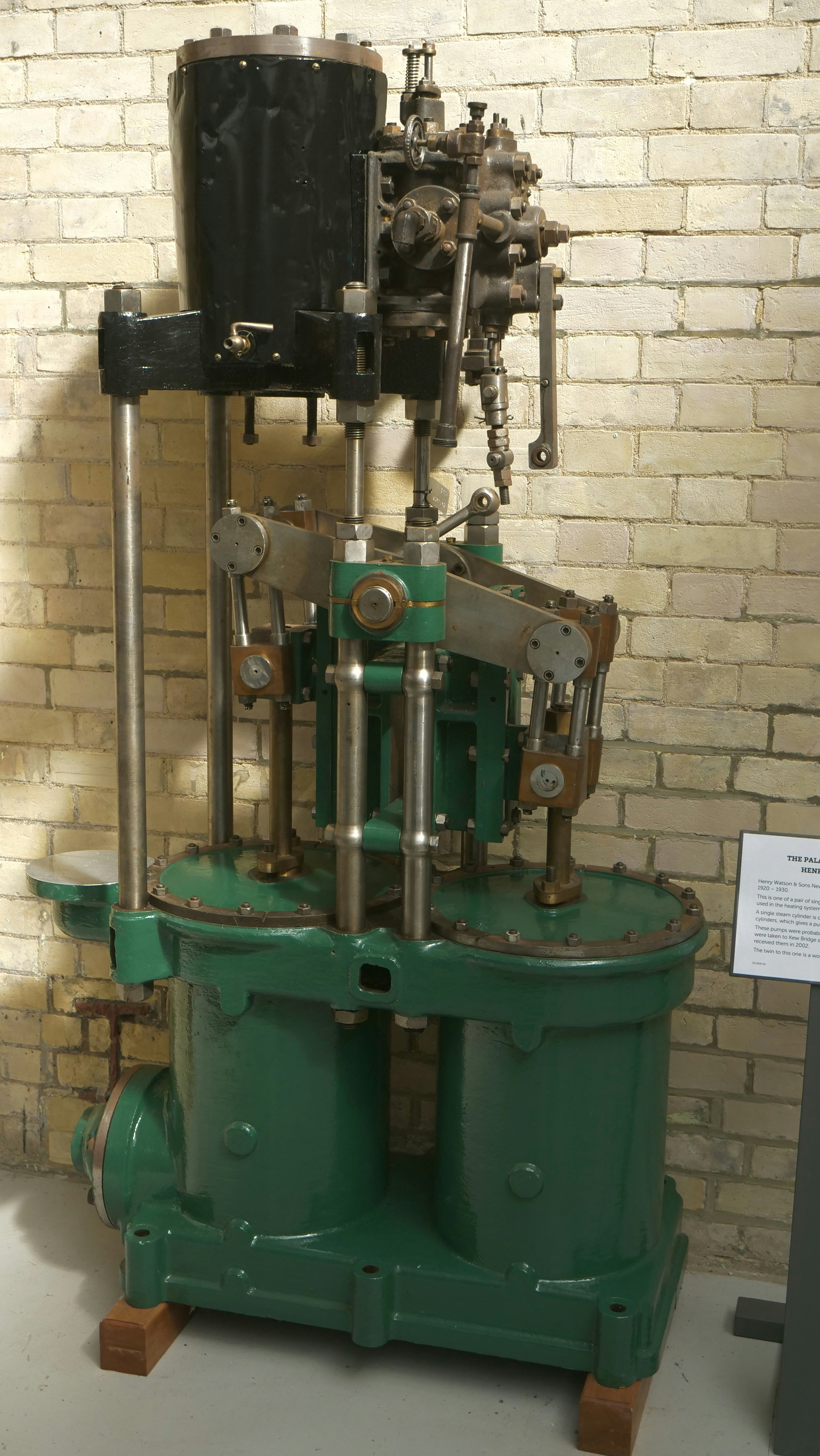 Industrial Core: A vintage green machine stair-stepping into history