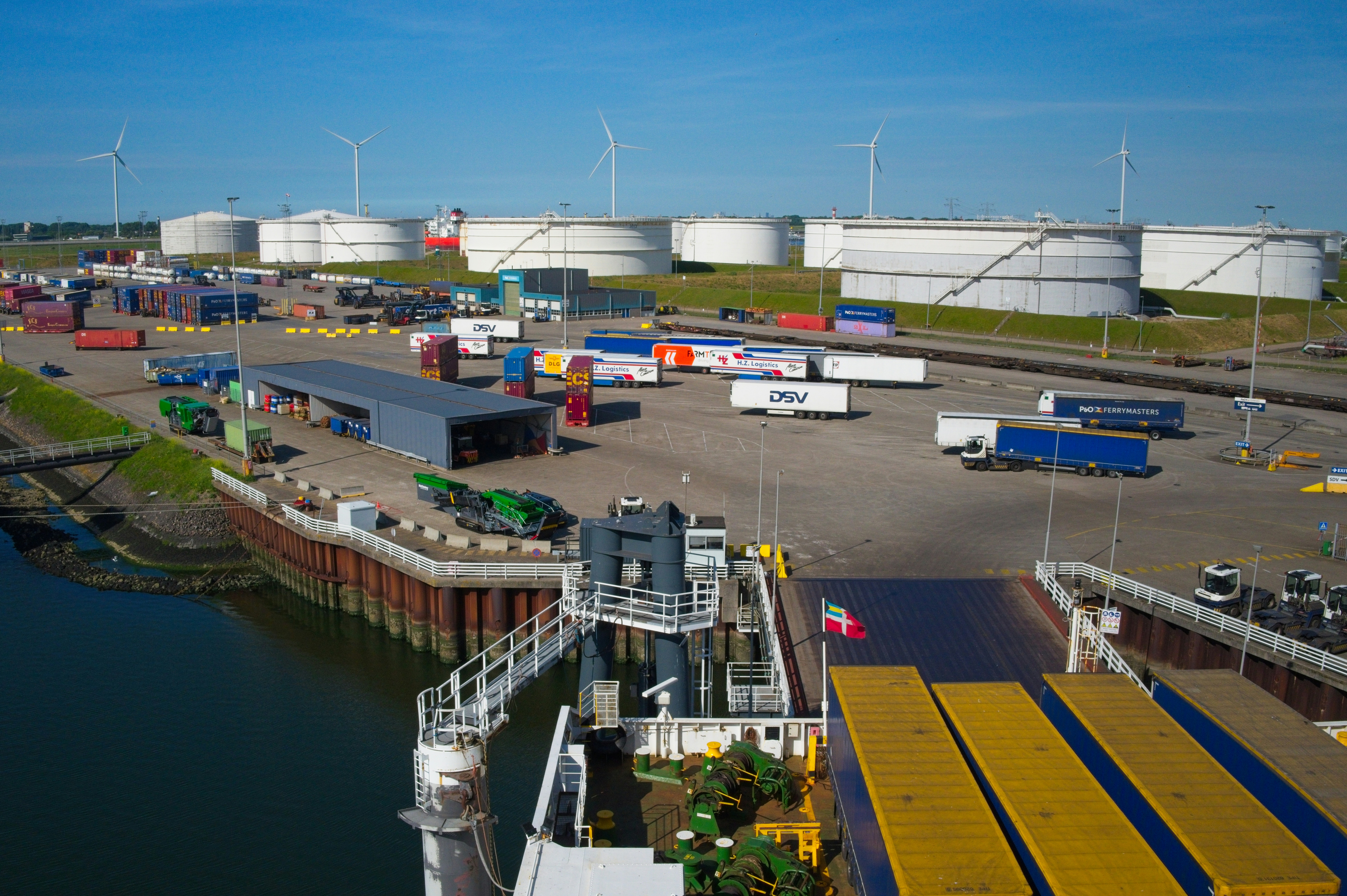 Harbor Logistics at Dusk: Aerial View Over the Wind-Swept Dock