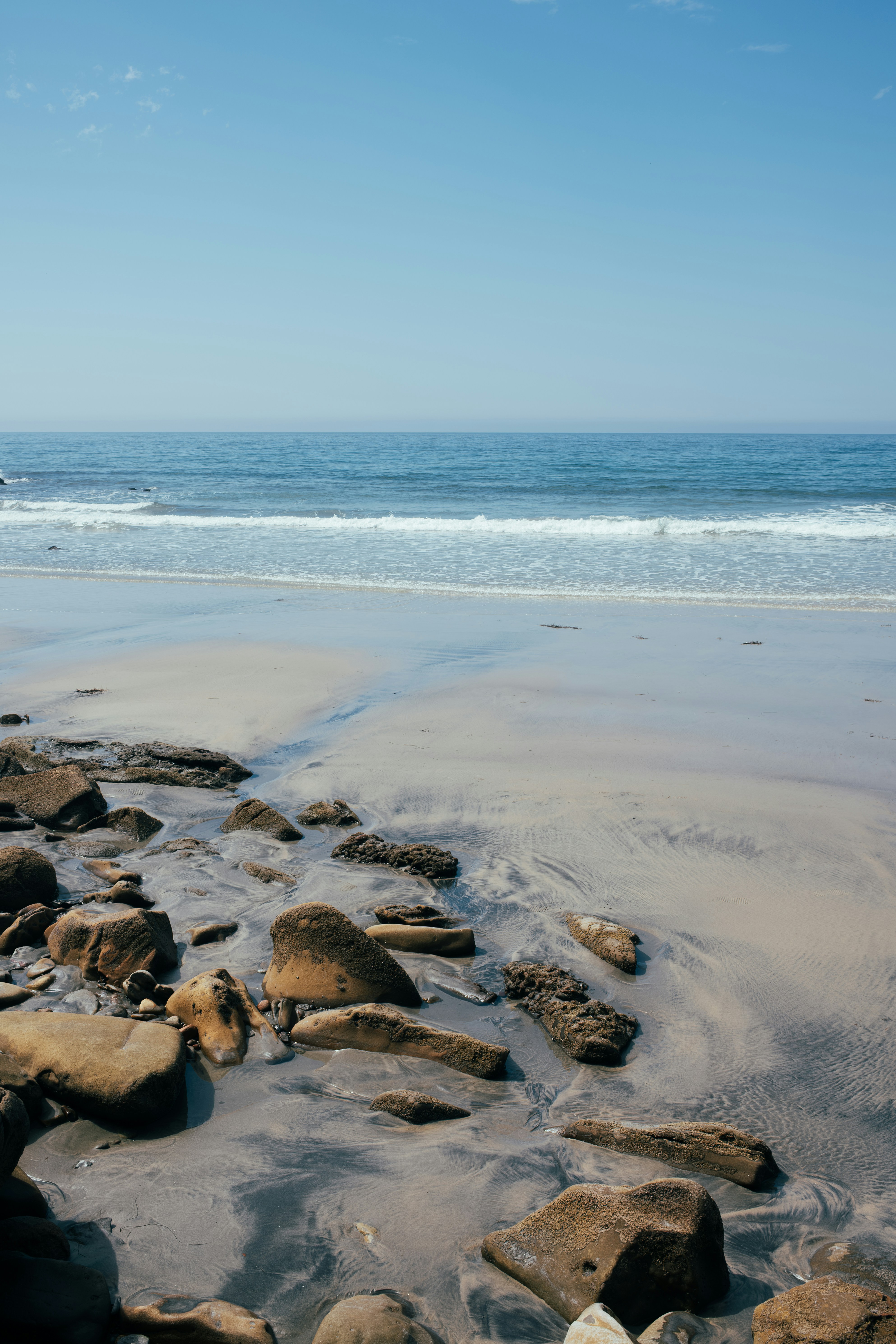 Quiet Tide at the Rocky Shoreline