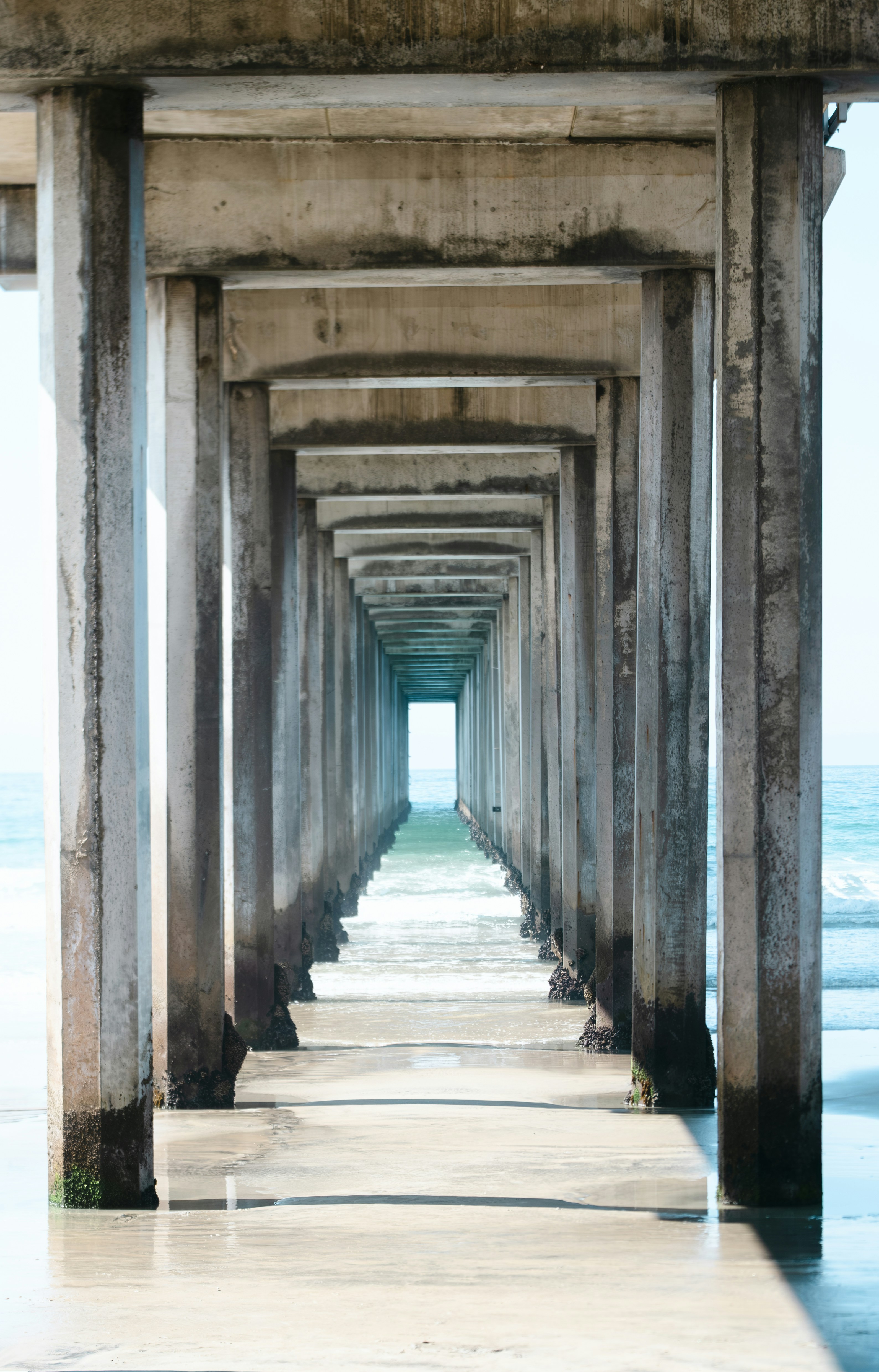 Symmetry Beneath the Pier: A Sea-Front Tunnel of Columns