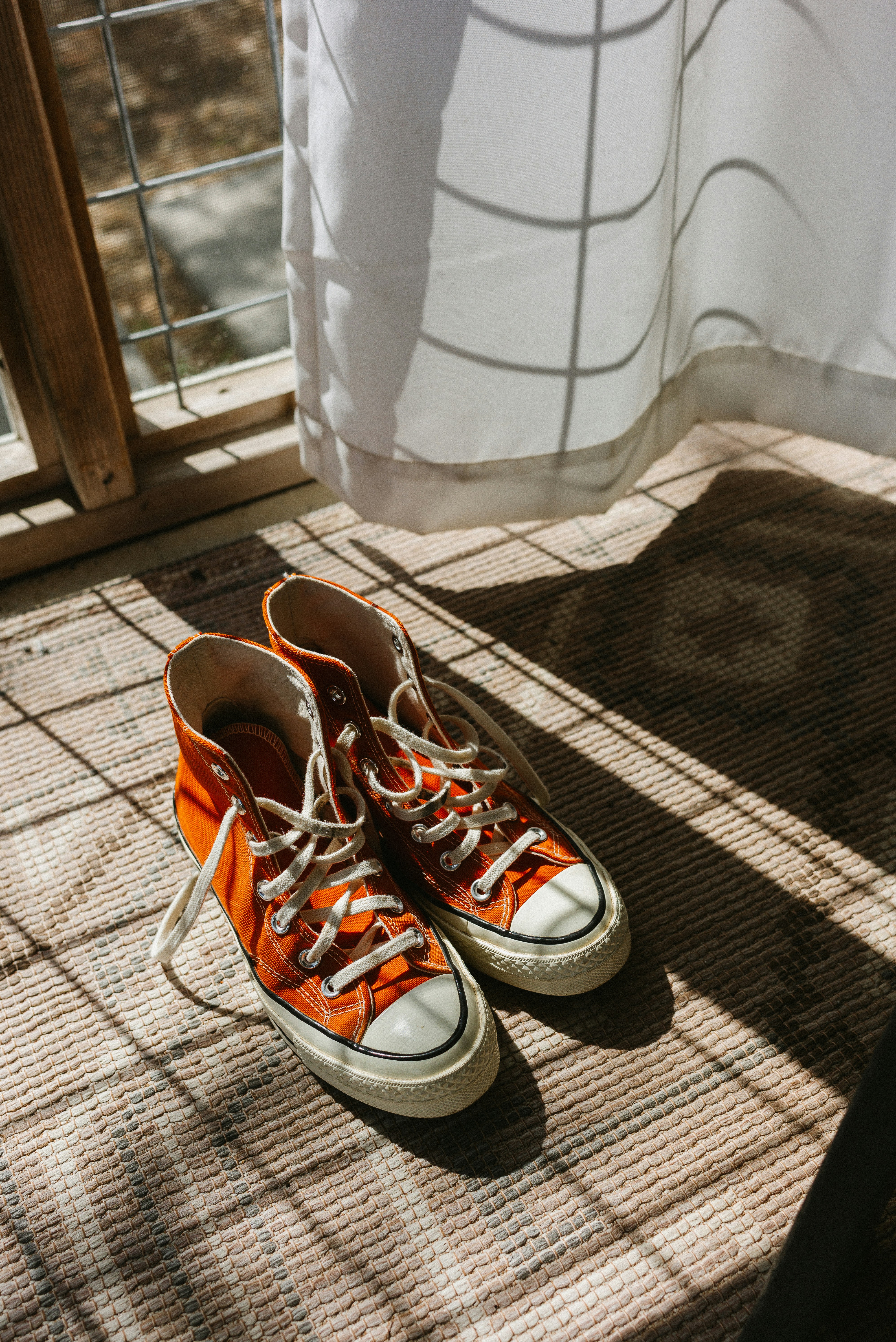 Orange Sneakers at the Sunlit Threshold