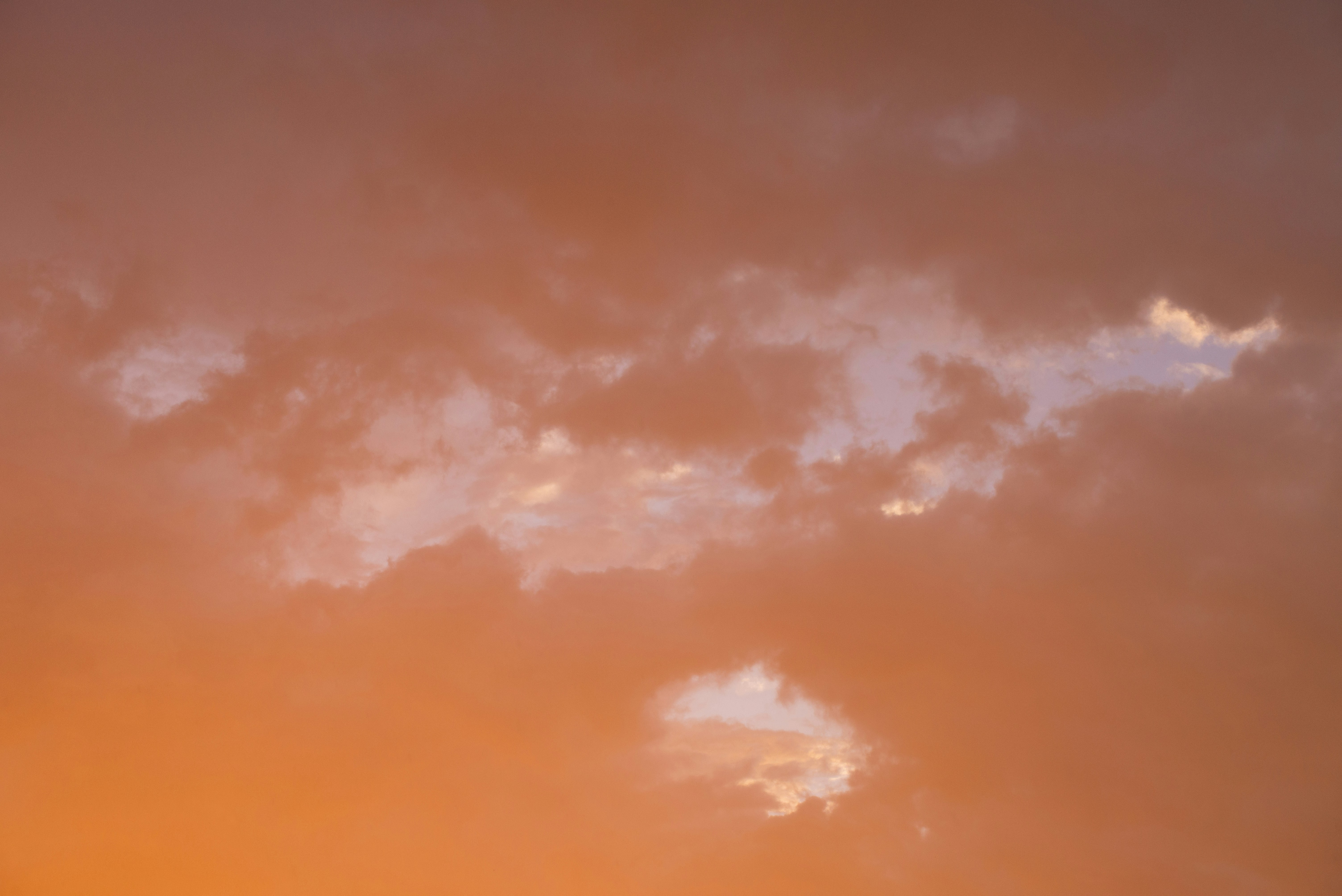 Ember Sky at Dusk: A Quiet Gradient of Orange and Peach