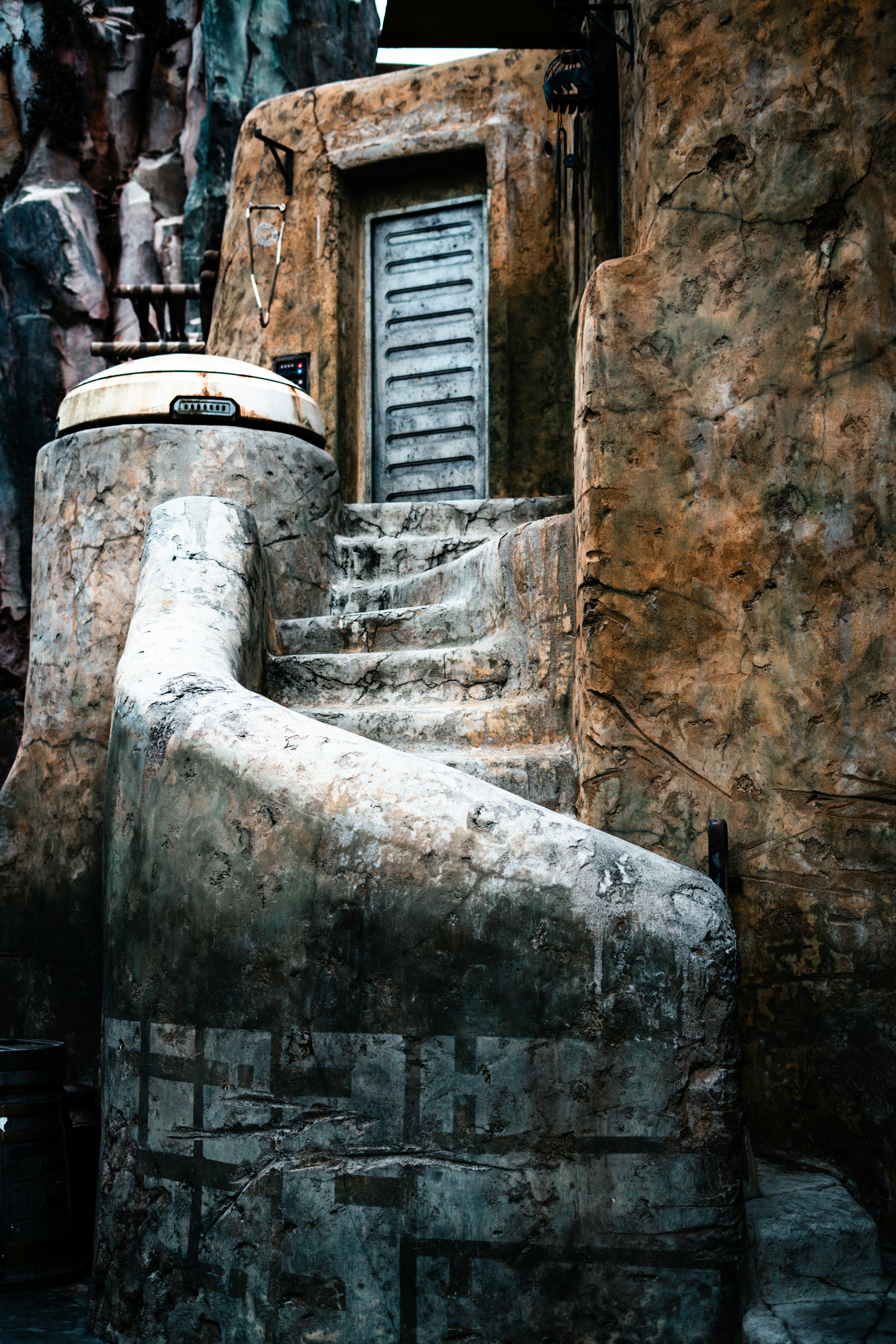 Arched Stair to the Past: Weathered Terrace and Sturdy Doorway