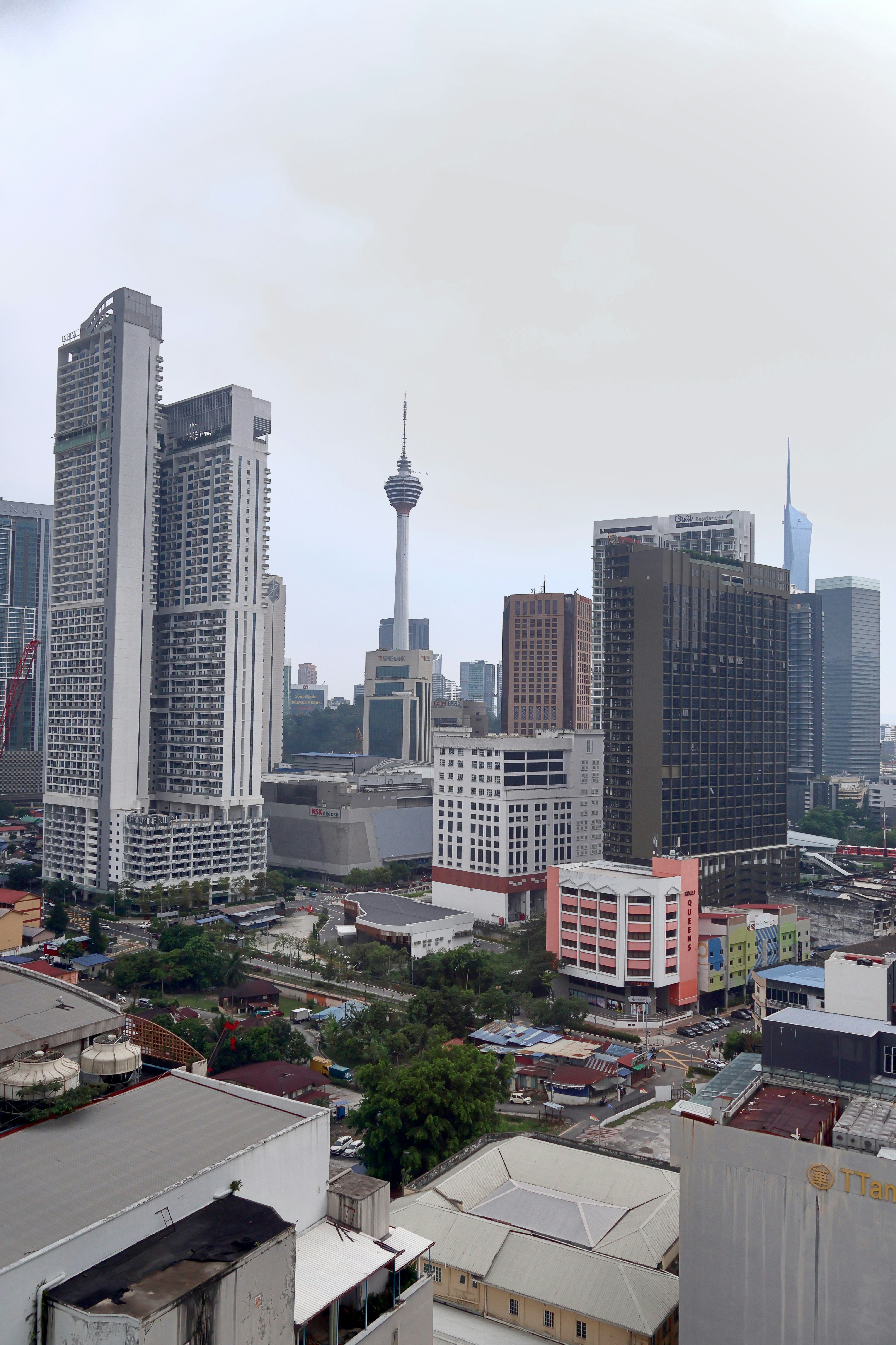 City Crown: A Kuala Lumpur Skyline with the Menara Tower Rising