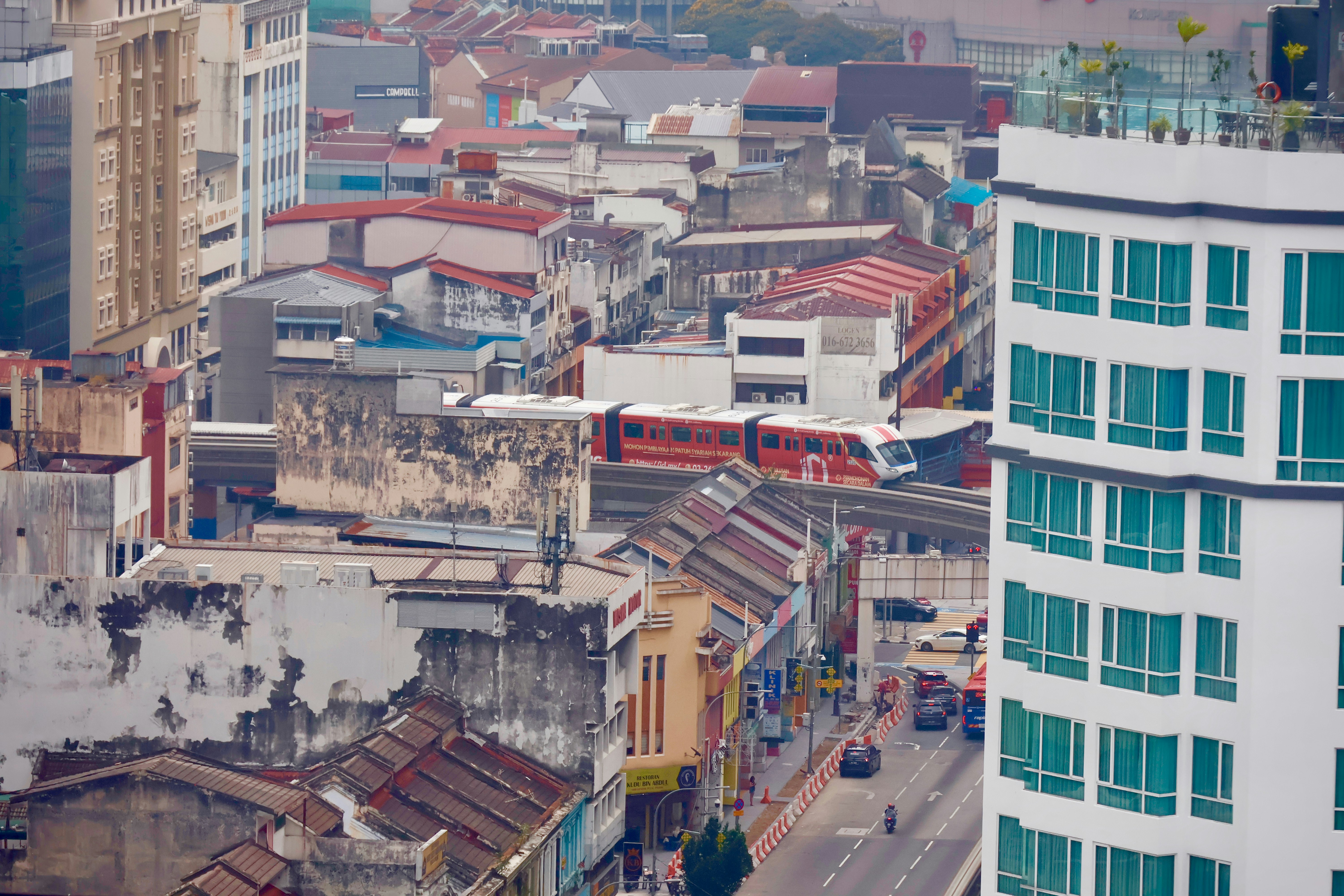 Urban Train Ridge: A Sunset Roar Over Rooftops
