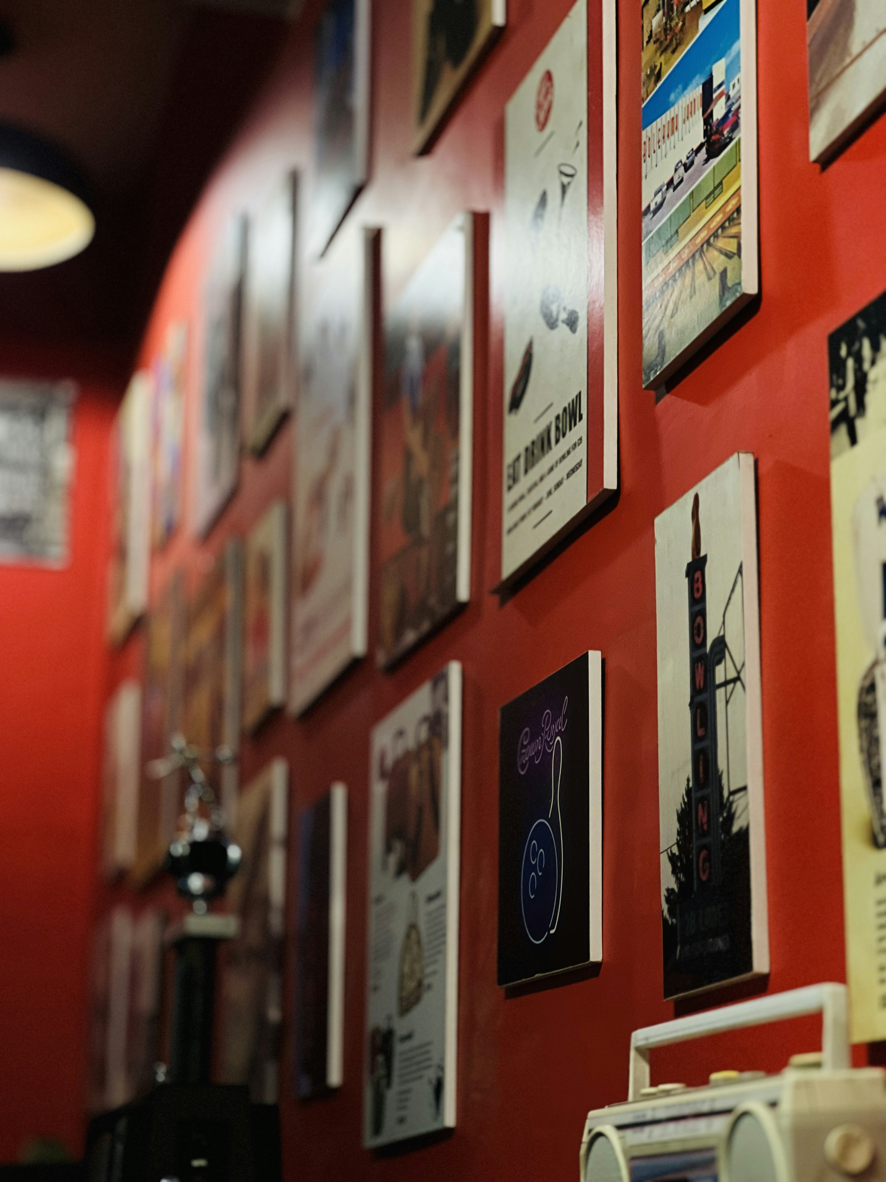 Red Gallery Wall: Framed Stories in a Cozy Exhibit Space