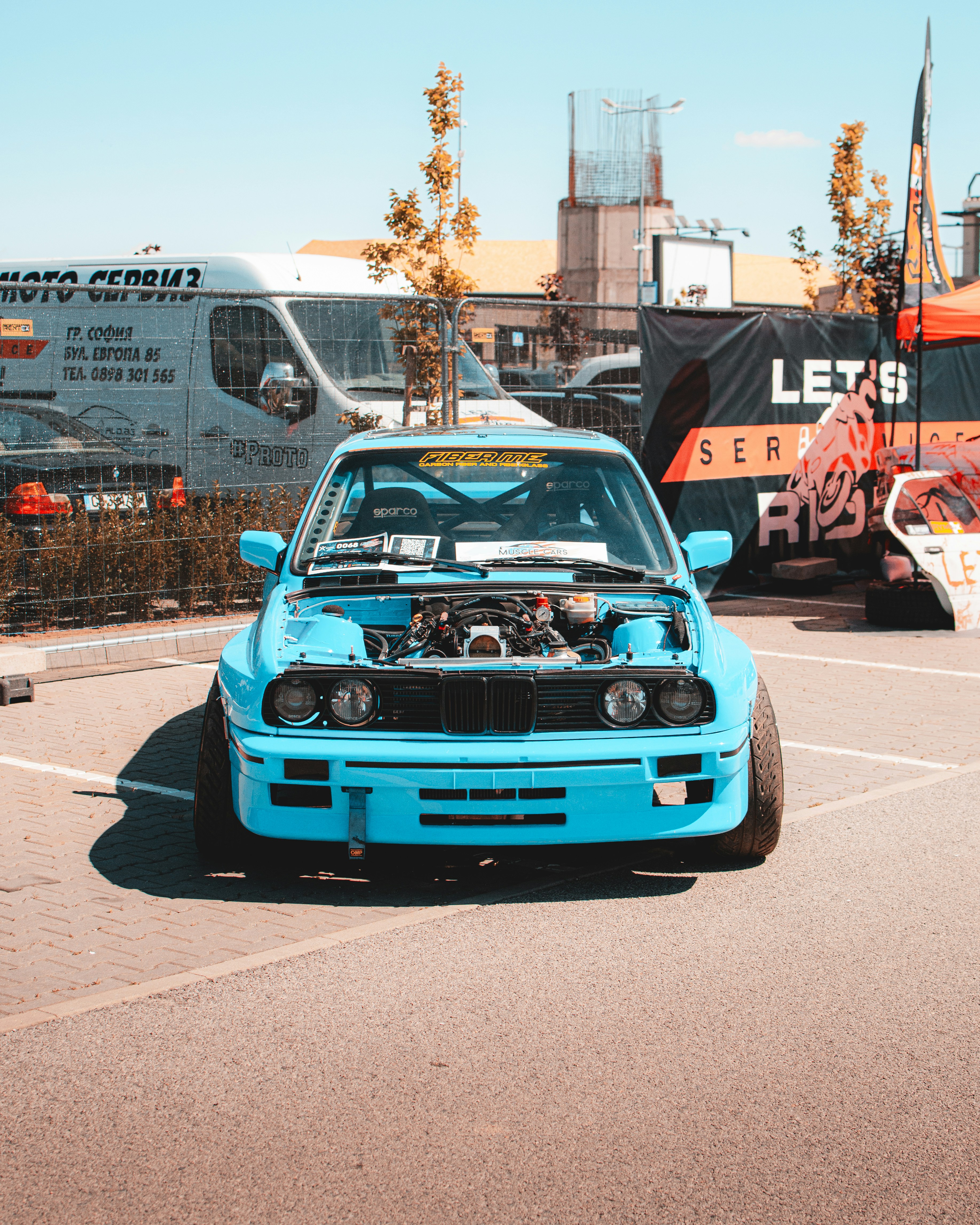 Blue Drift: A tuned civic under the bright show lights
