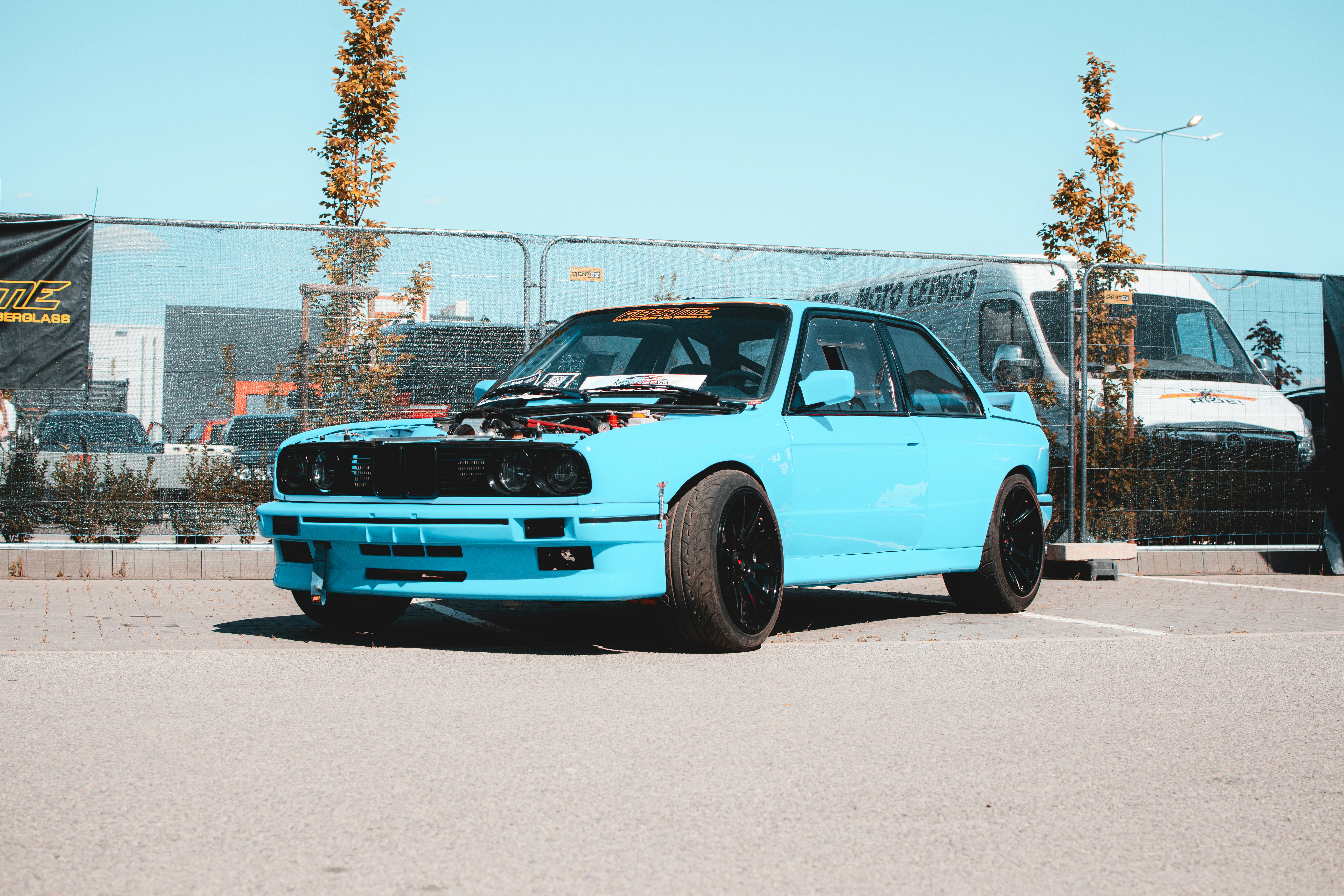 Blue Drag: A Stanced Classic under a Clear Sky