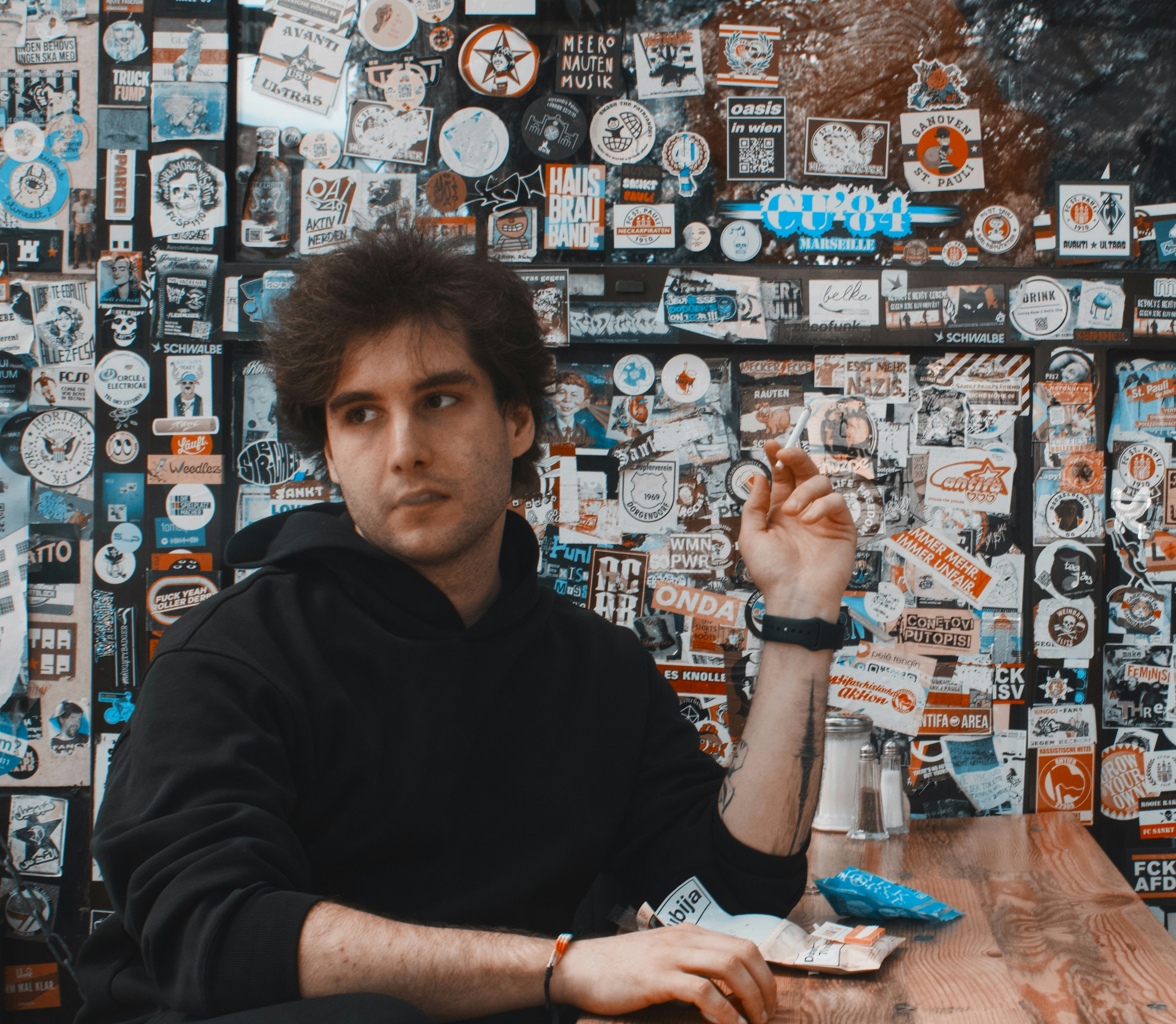 Graffiti Wall Portrait: A Quiet Look Beyond the Sticker Maze