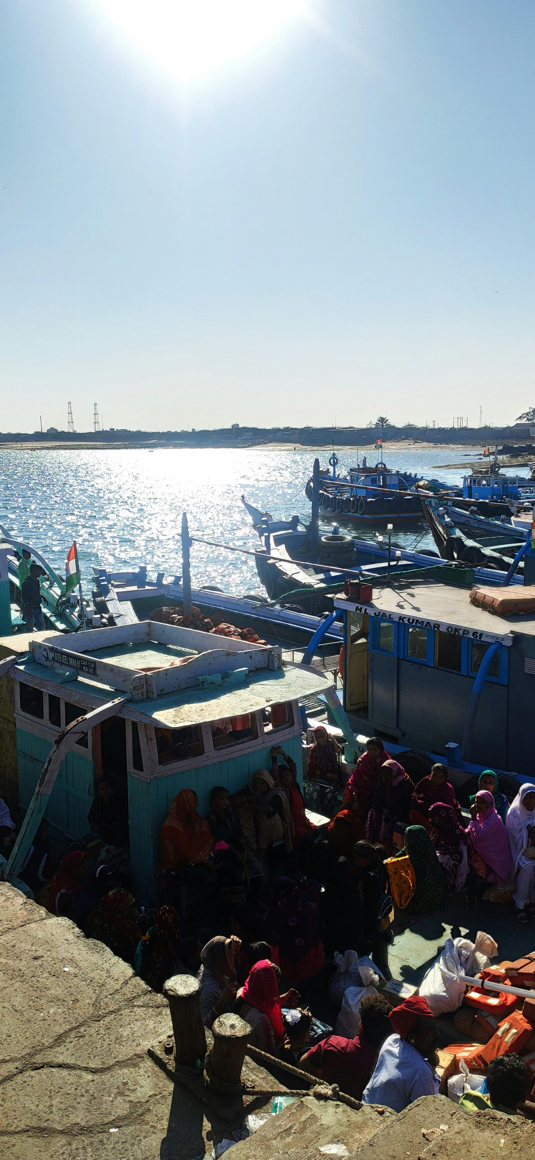 Harbor Crowds in Sunlit Silence