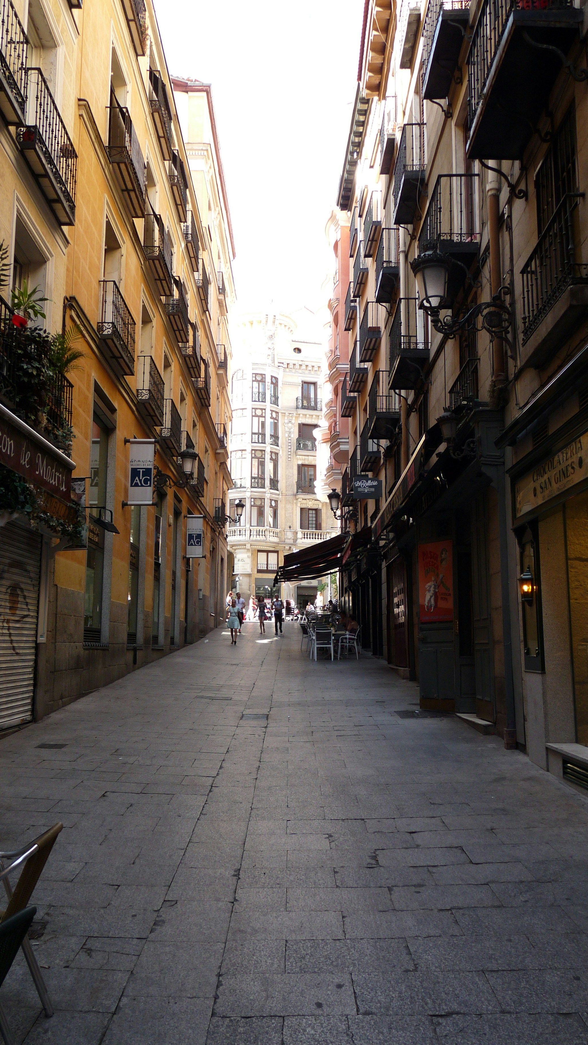 Canted Alleyway Toward the Sunlit Crown
