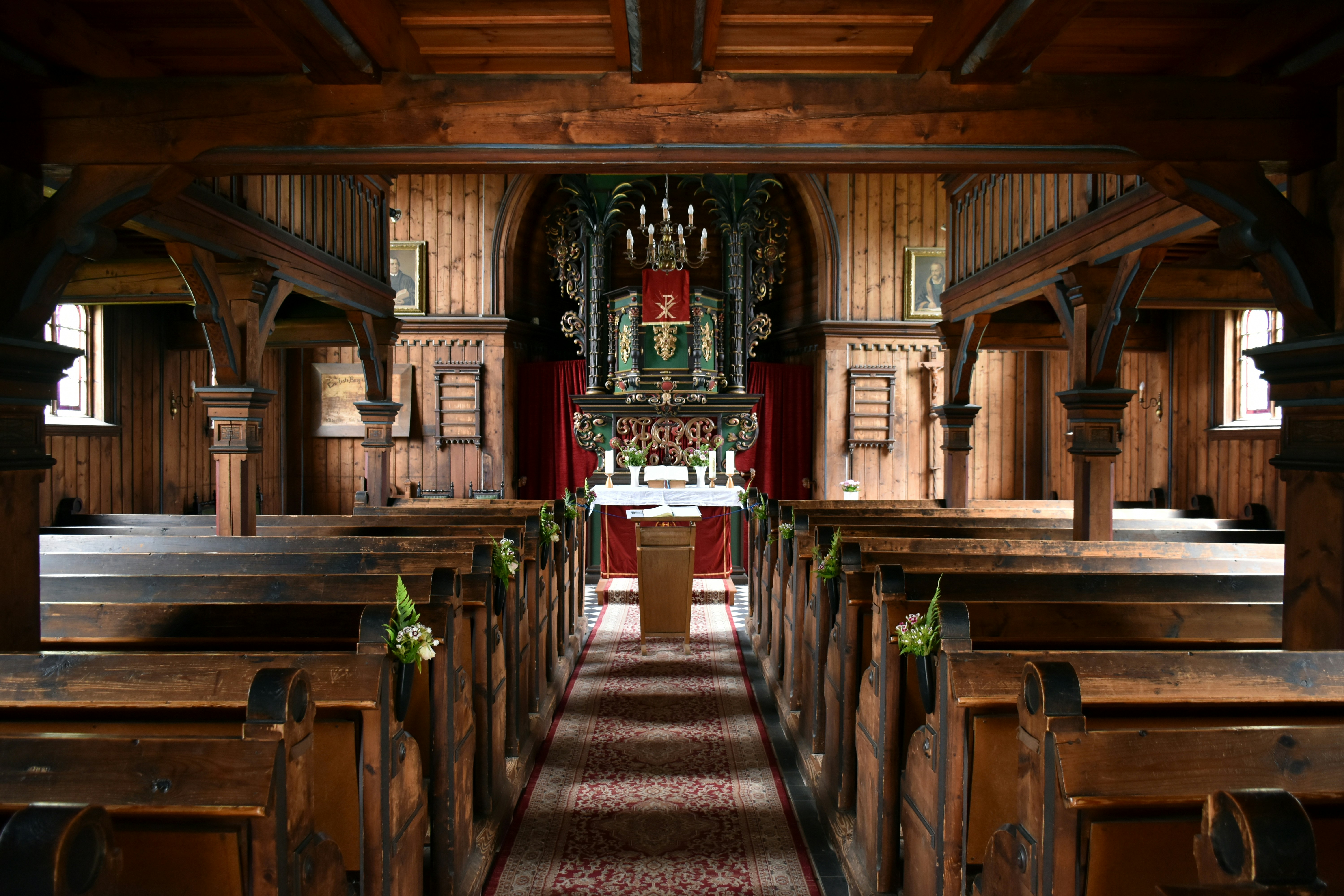 Centered Sermon: A Wooden Chapel Gallery Reaching toward the Altar