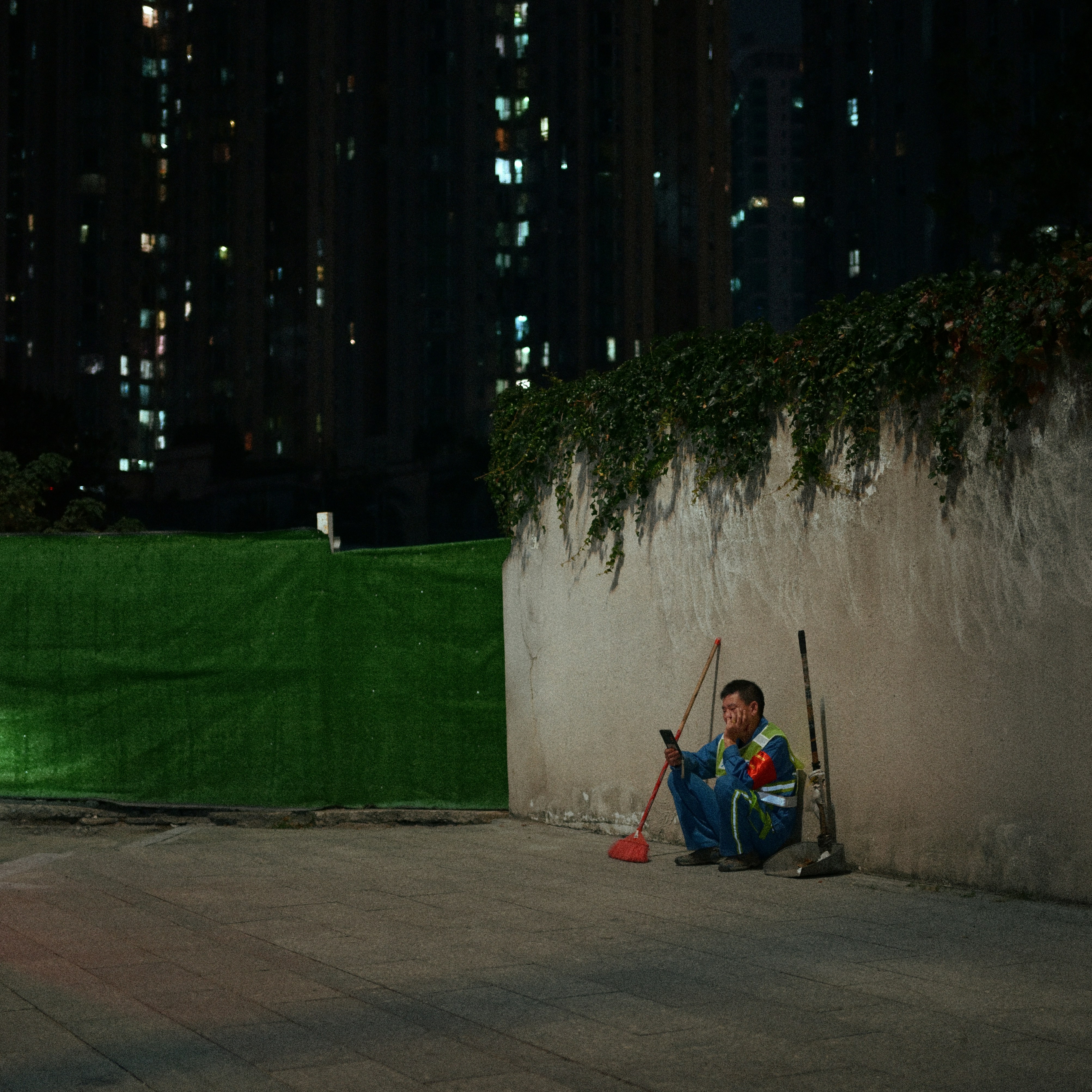 Night Shift by the Wall: A LONE Worker in Concrete Night