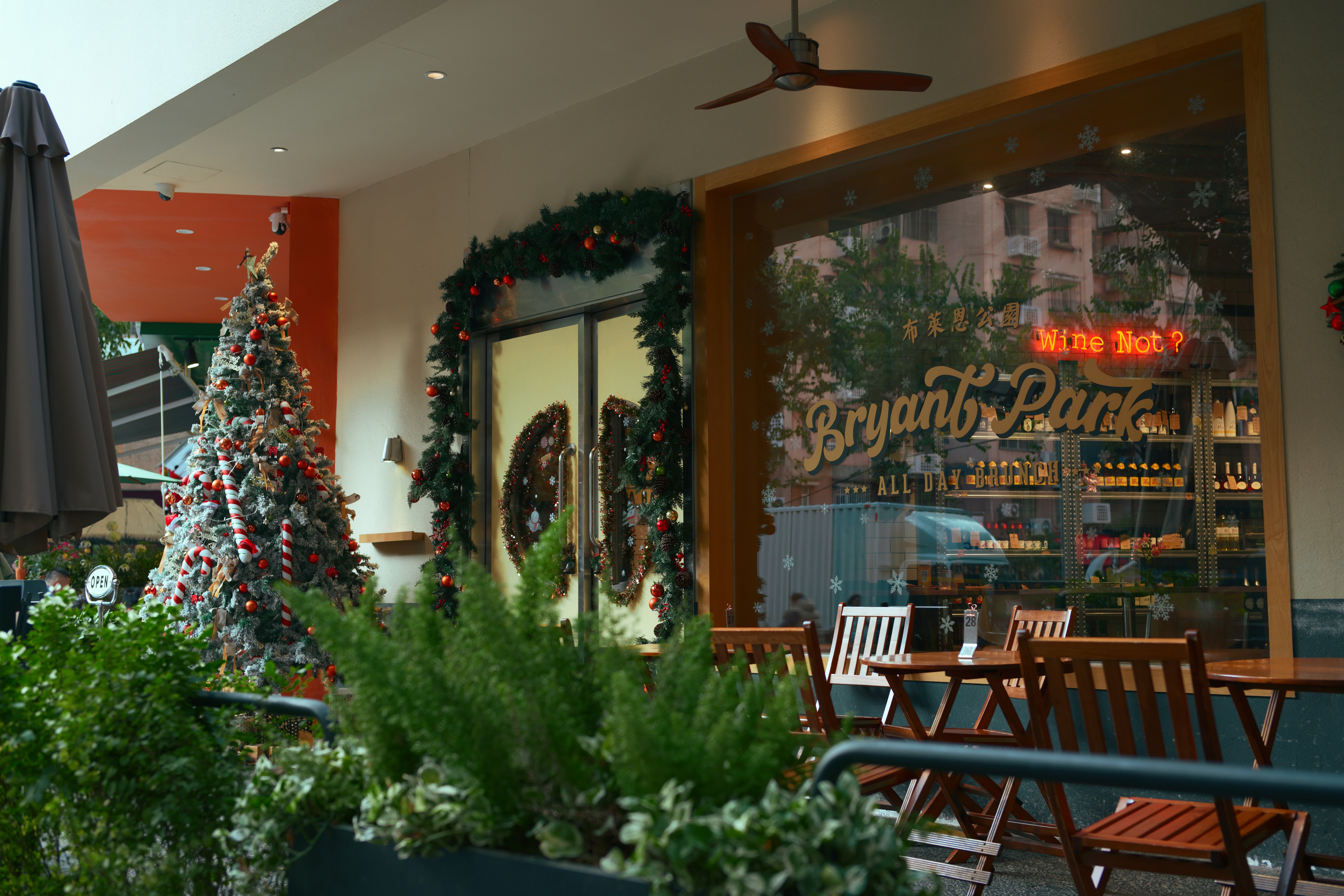 Holiday Café Terrace Framed by Festive Decor