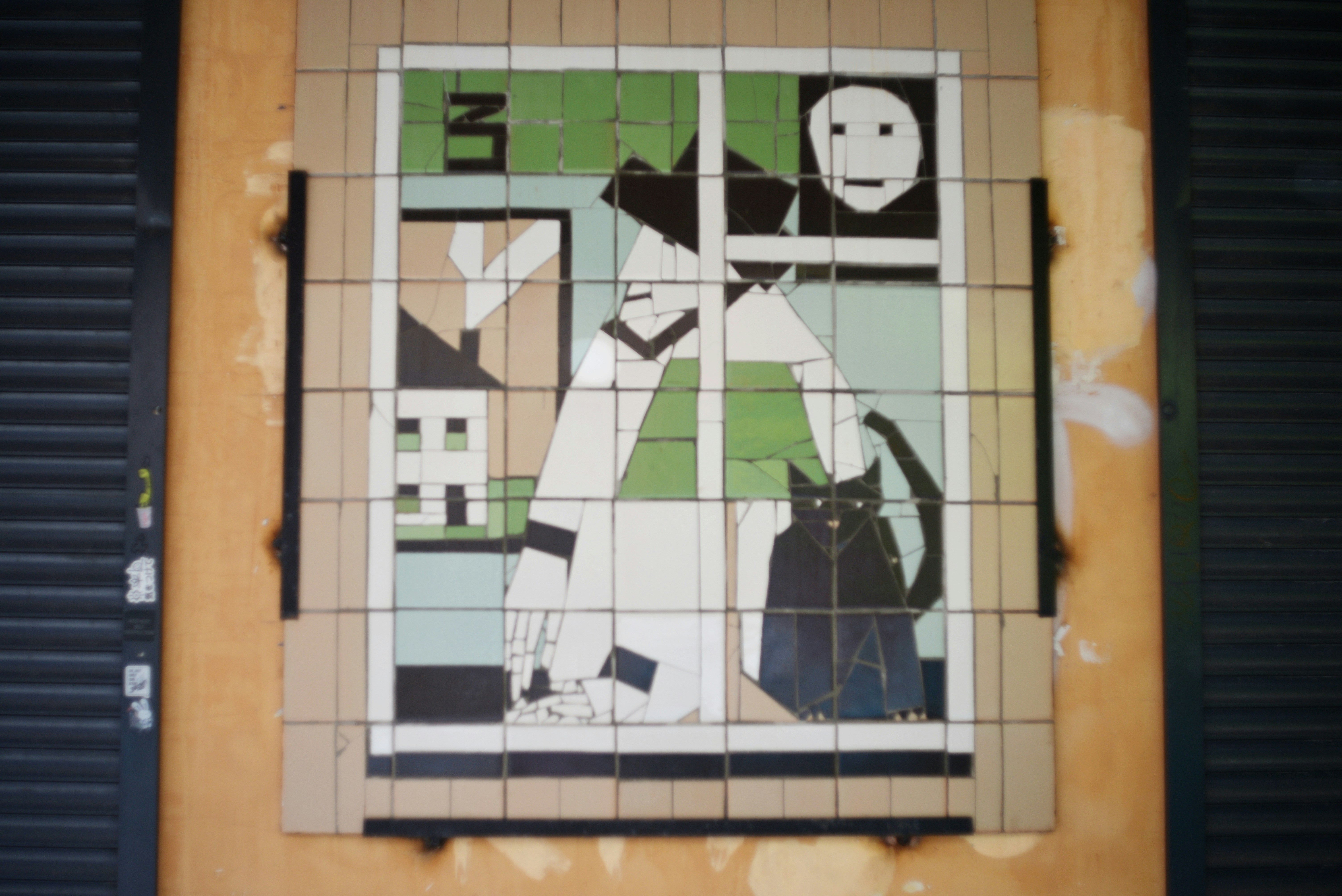 Geometric Mosaic Portrait Behind a Warm Orange Frame